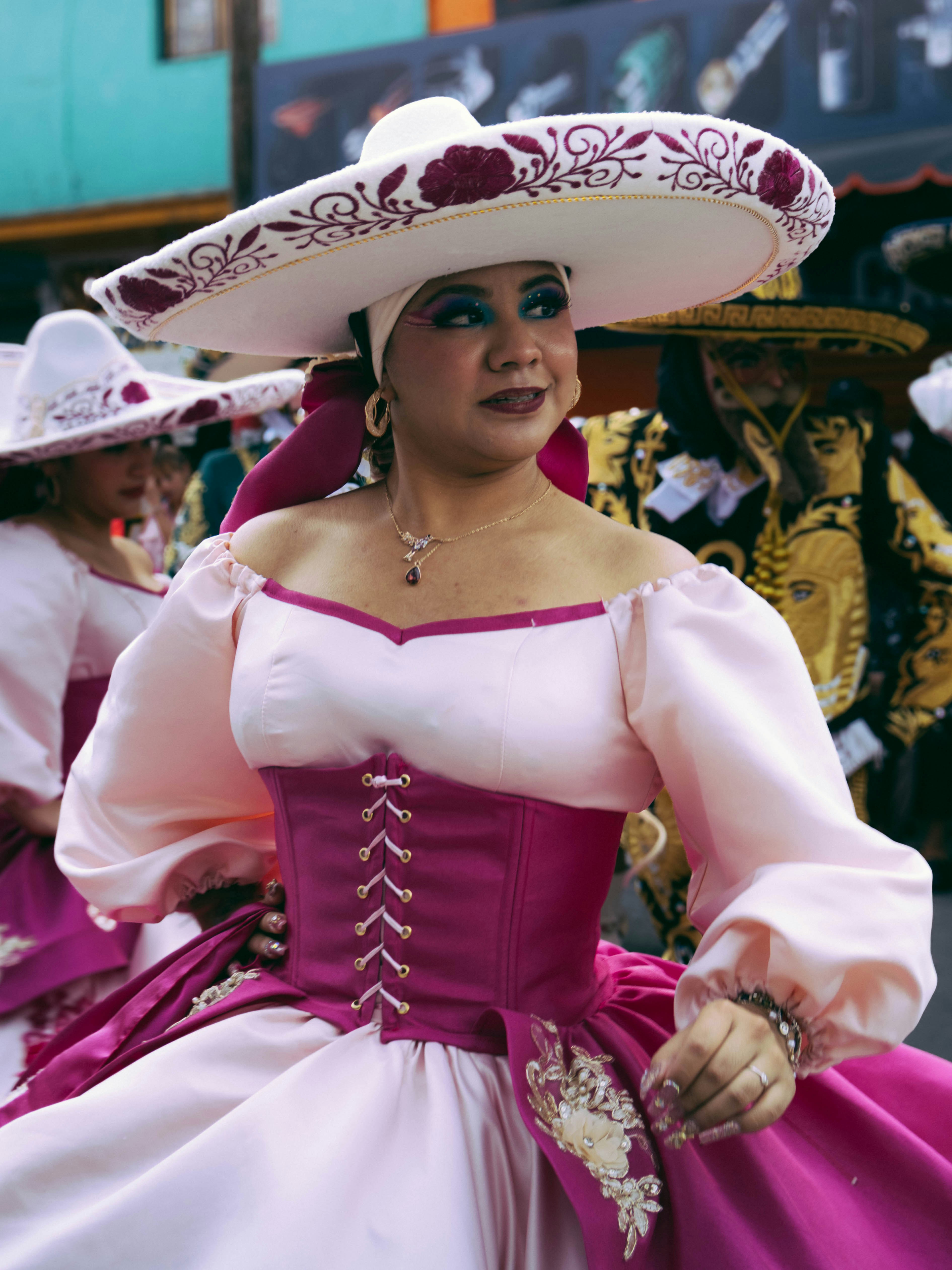 Festive Portrait in a Frilly Pink: The Mariachi-Inspired Parade Queen