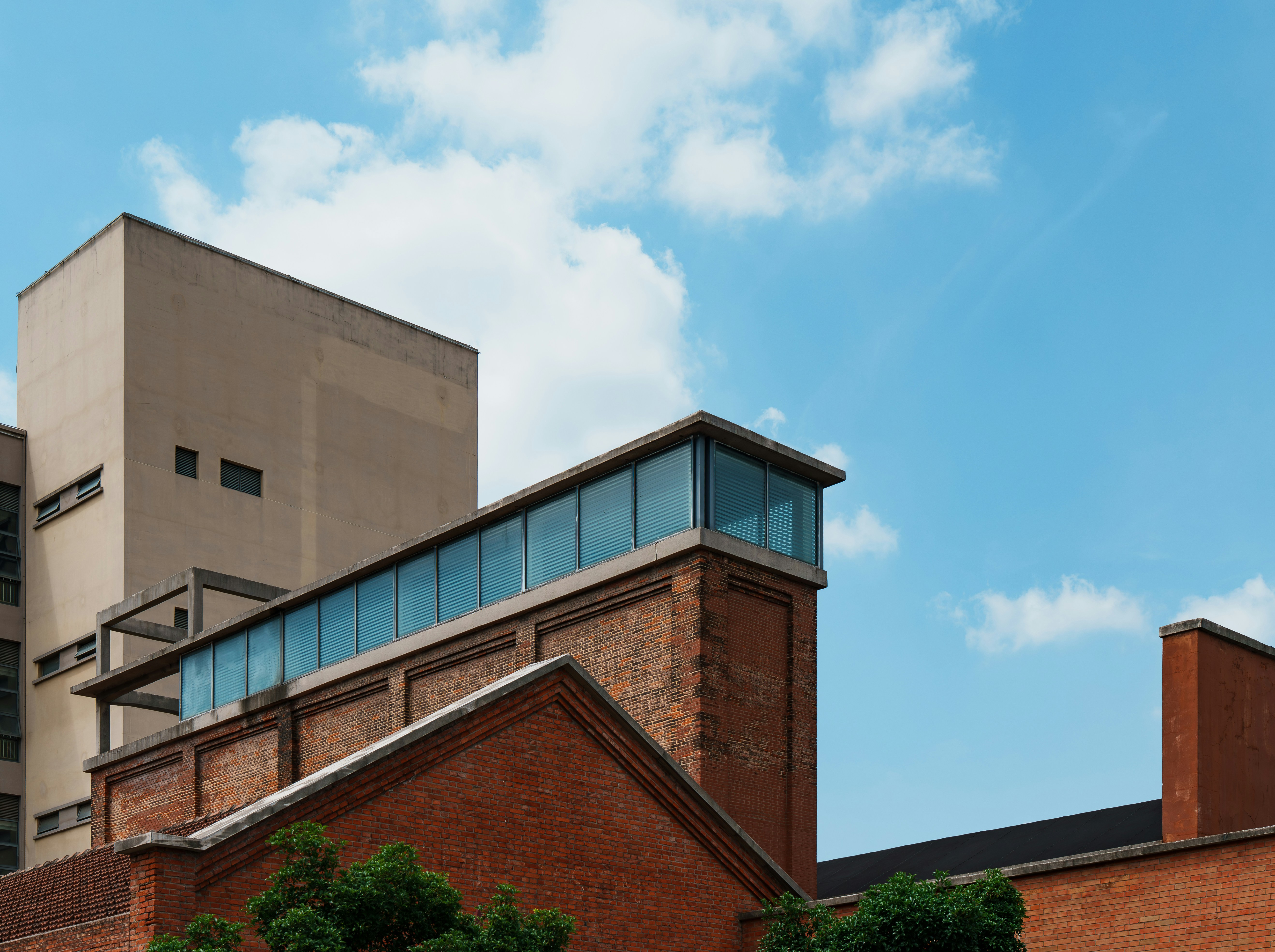 Brick Rooftop Lines Against a Bright Sky