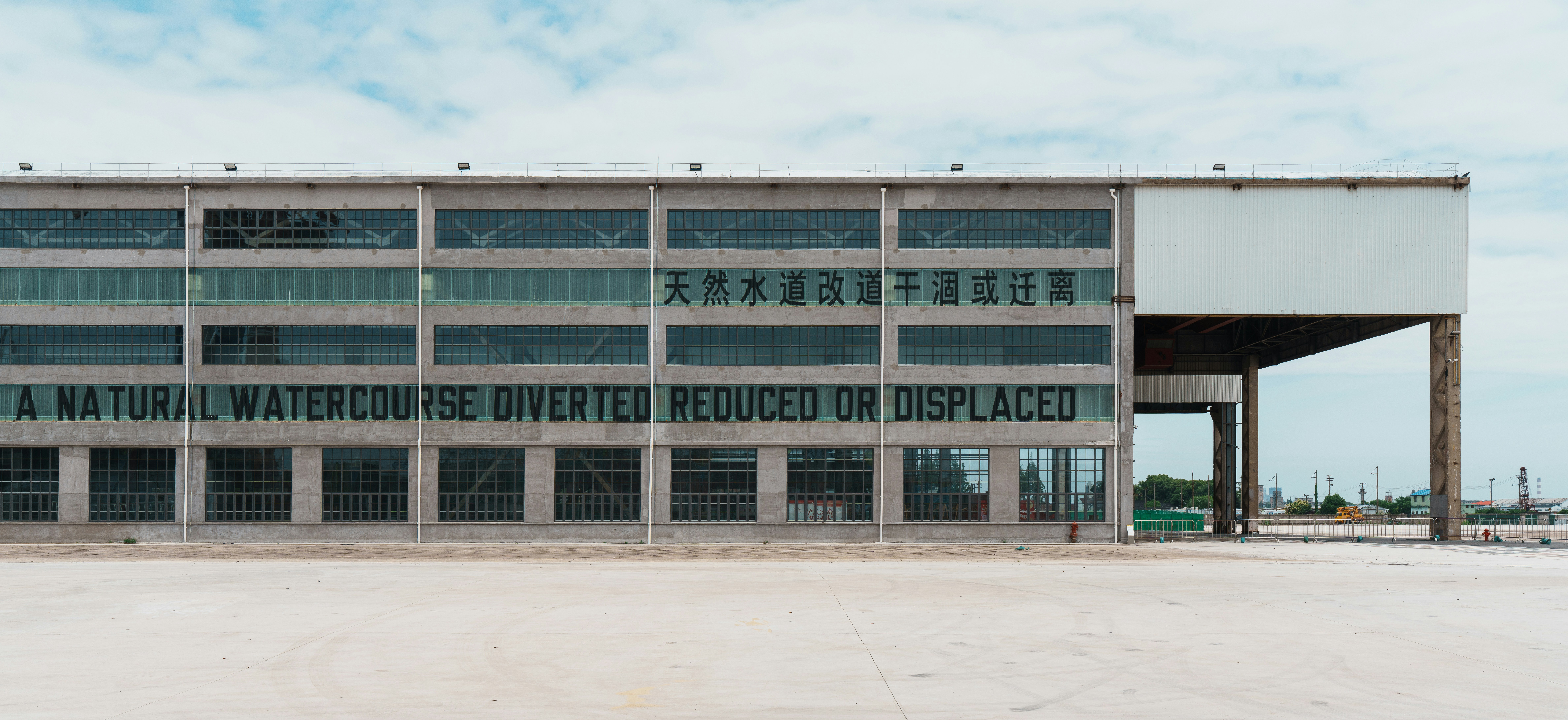 Industrial Facade: A Quiet Corridor of Glass and Concrete