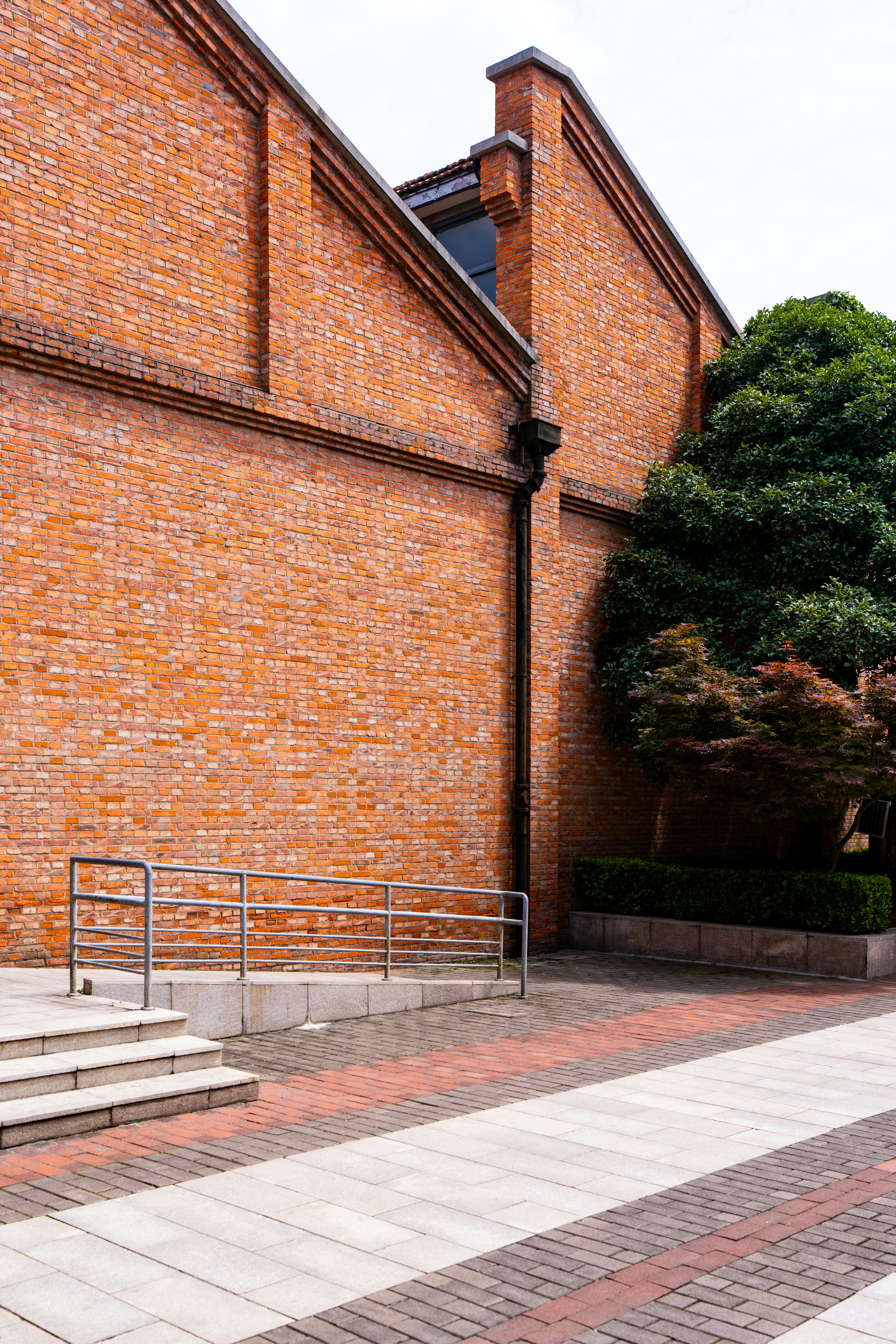 Brickwork and Ramp: Quiet Urban Corner by the Courtyard