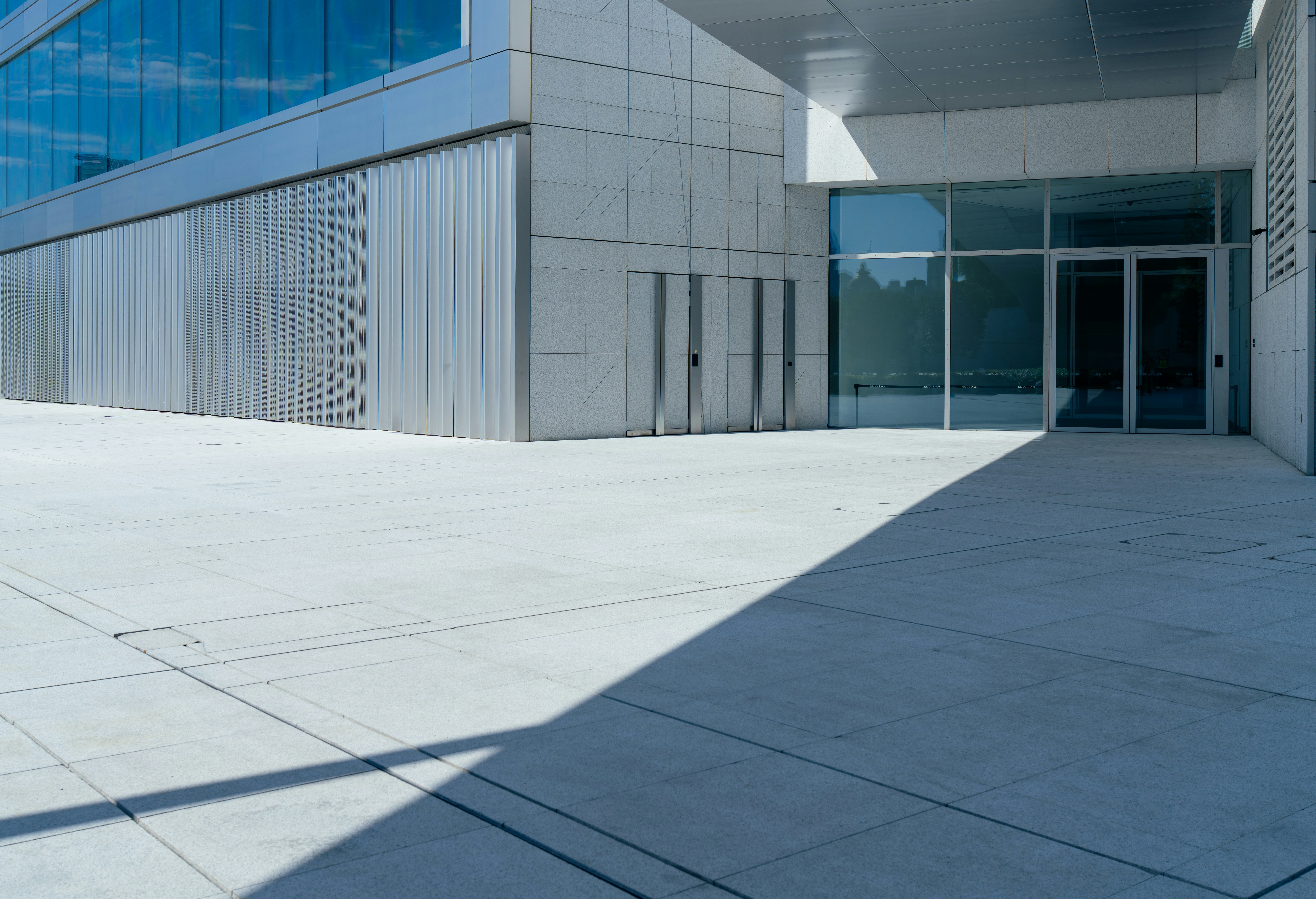 Shadows Over Glass and Concrete