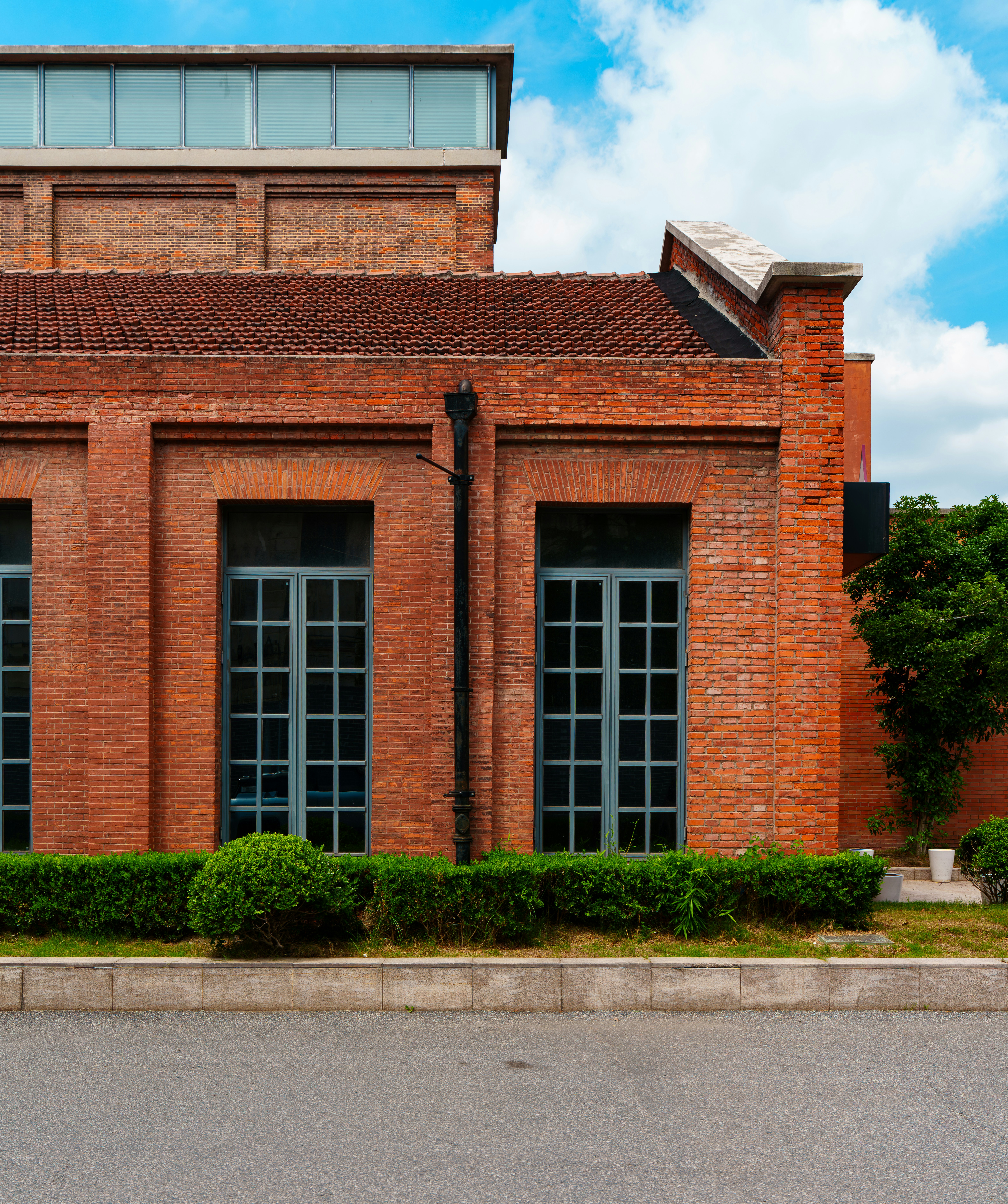 Brick Facade and Glass Doors of a Modern-Industrial Building