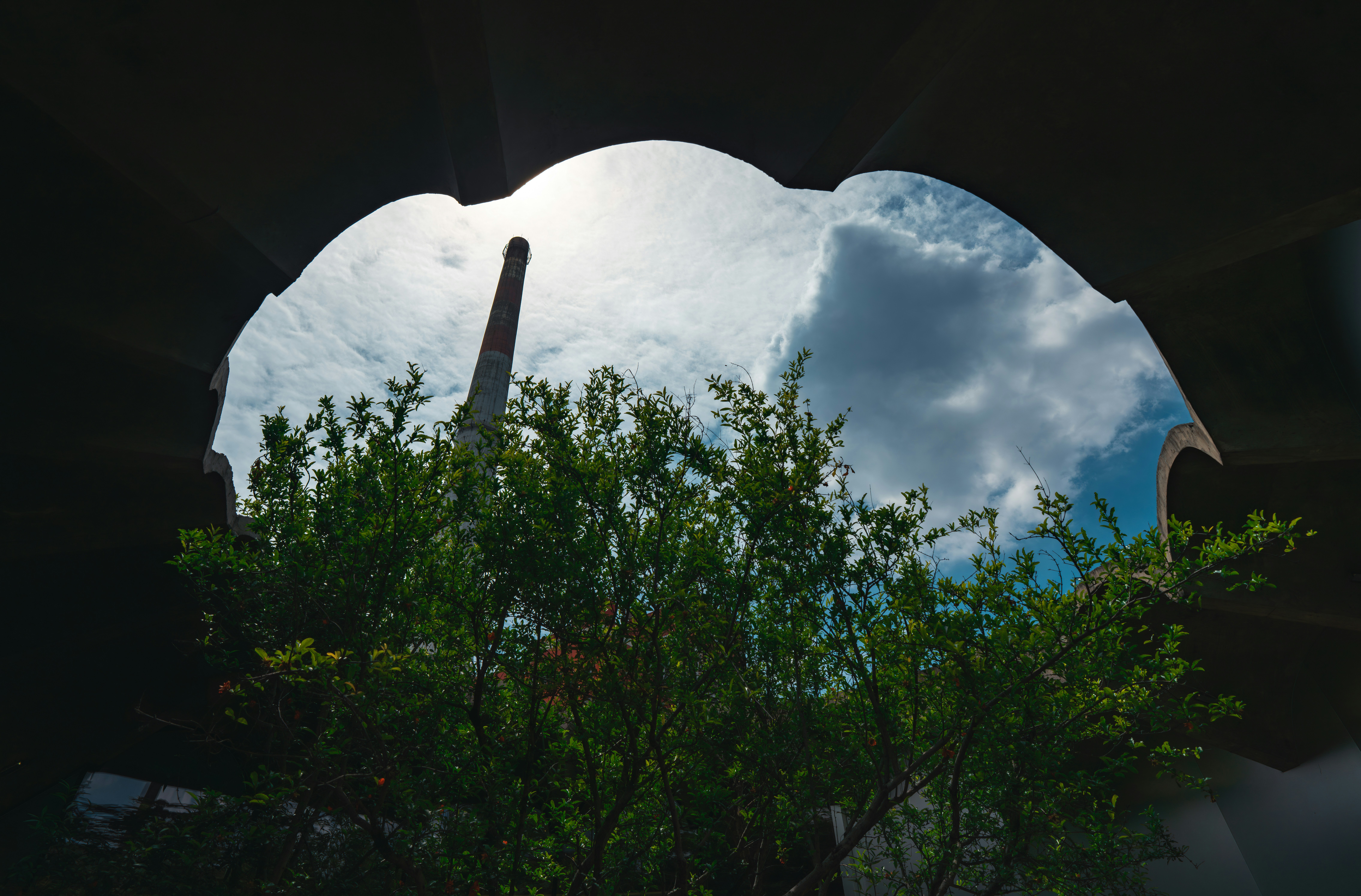 Crescent Arch Overlook: Sky, Trees, and Monument