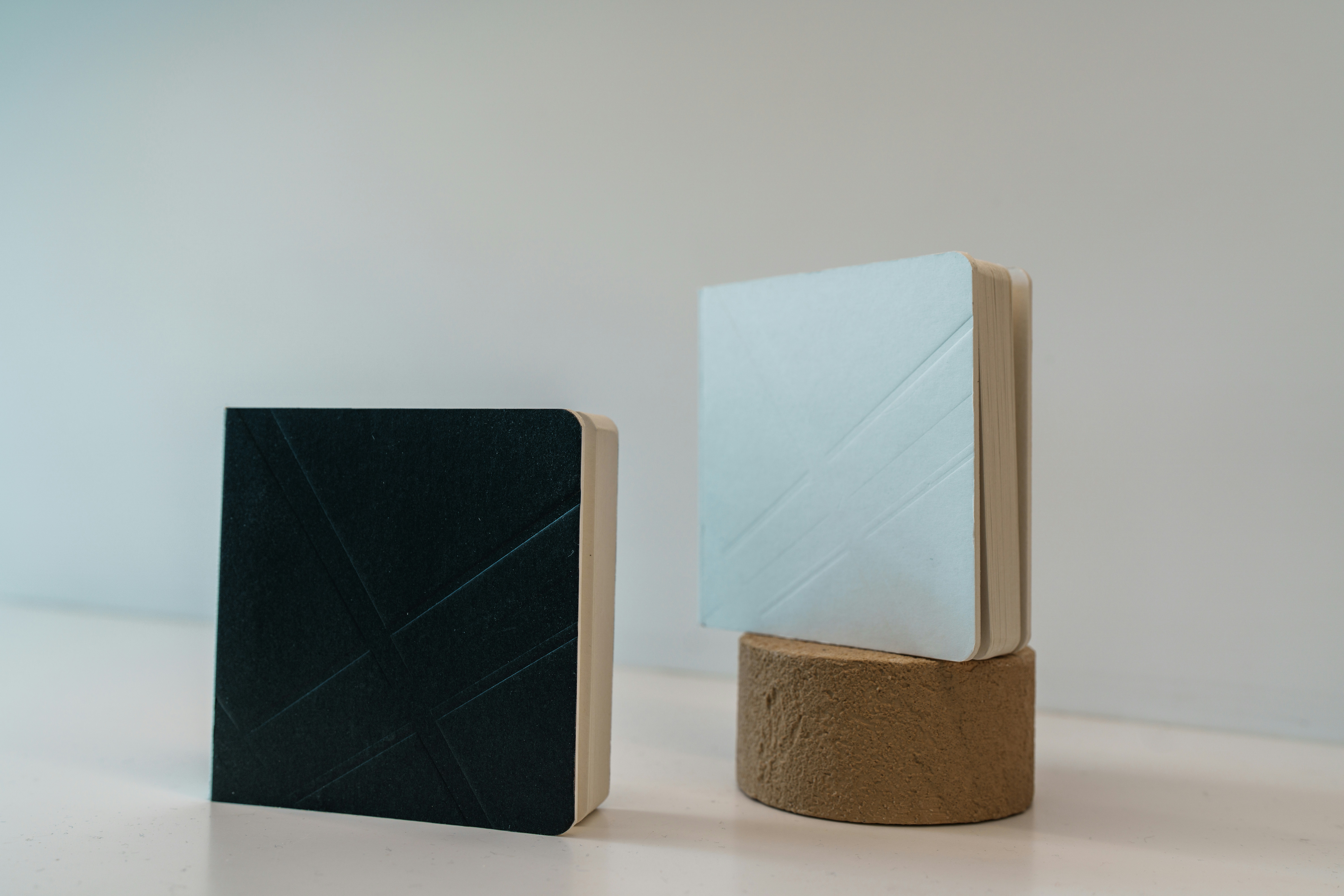 Minimalist Chess of Shadows: Black and White Tiles on a Quiet Surface