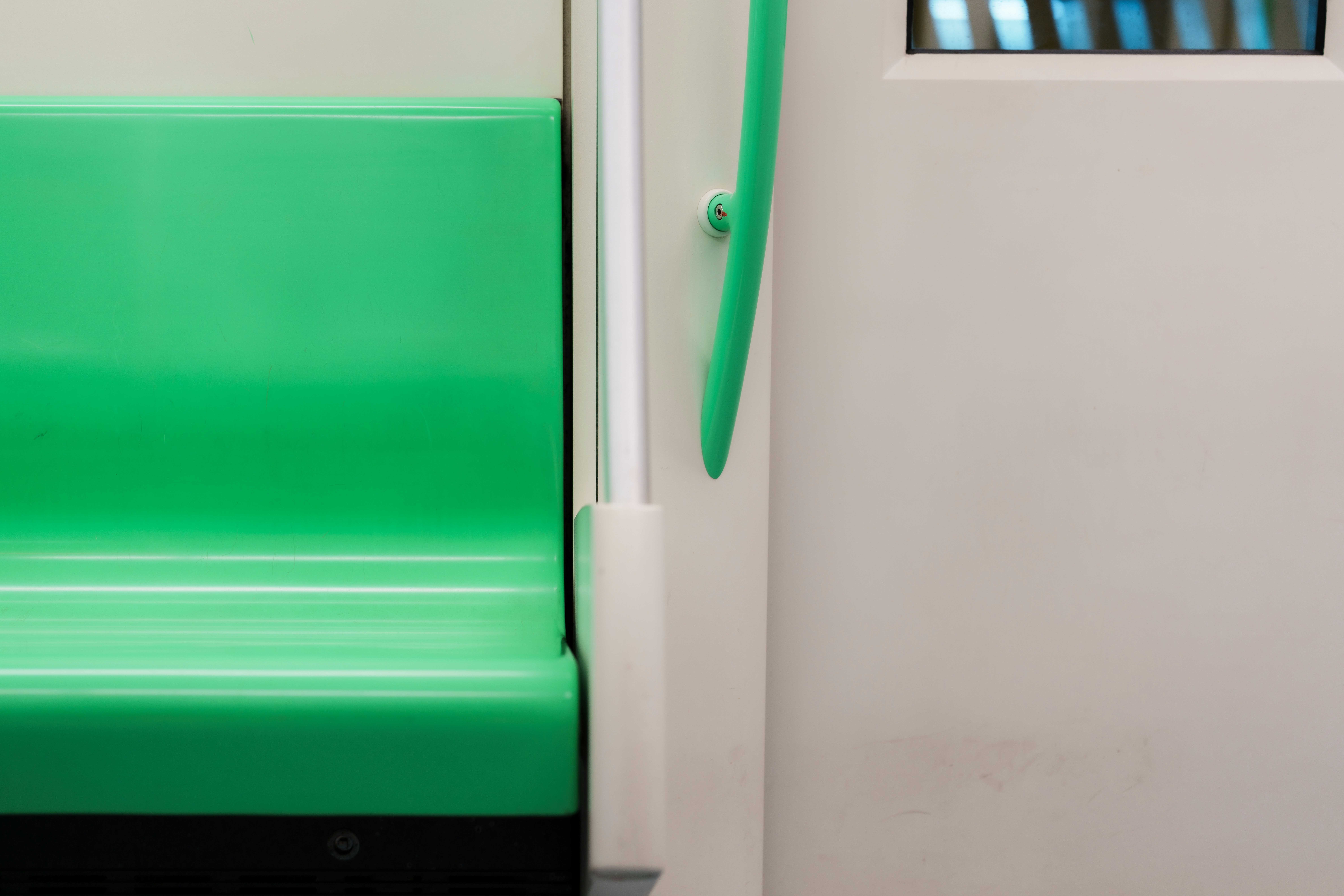 Electric Green Gap: A Seam Between Carriage and Wall