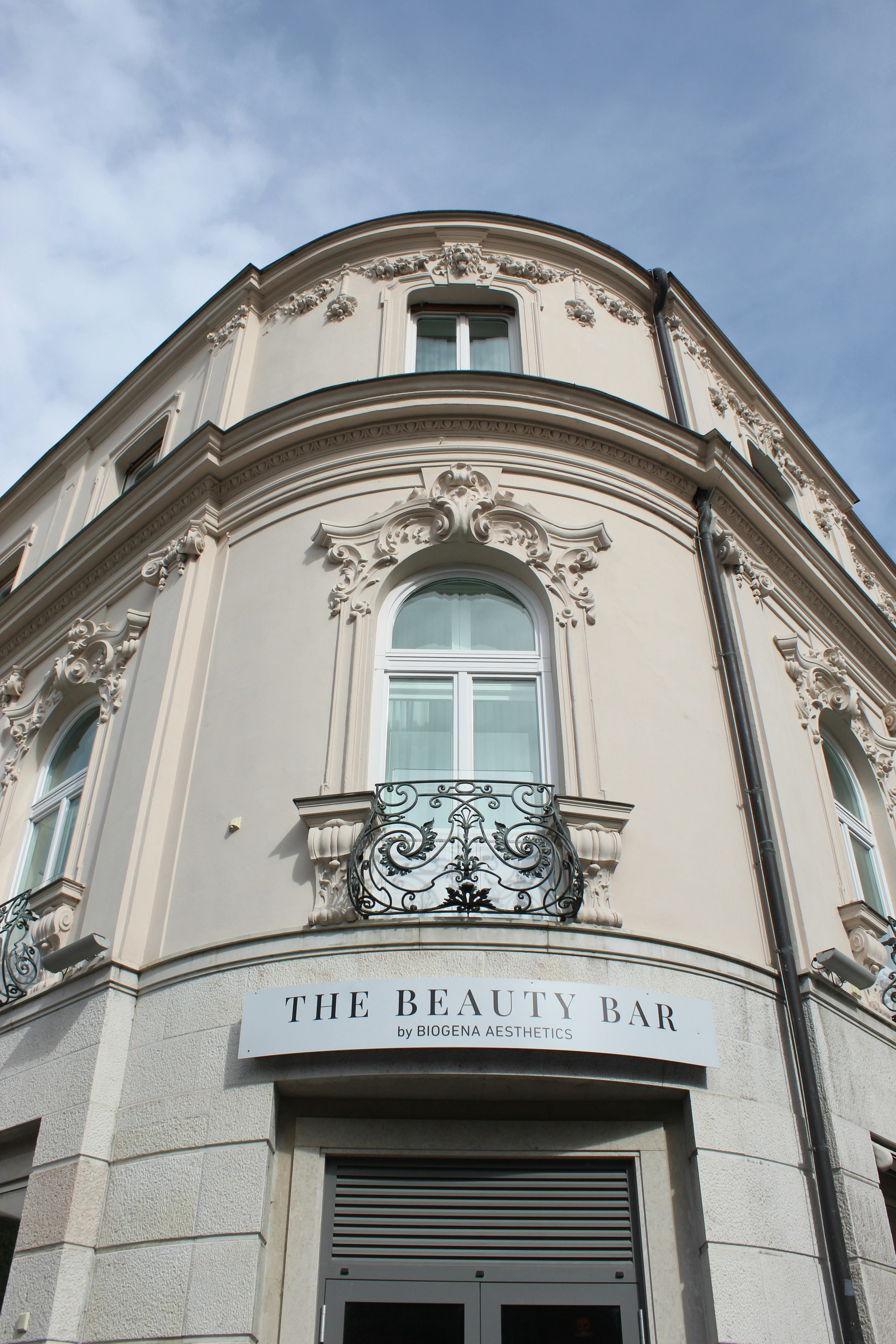 Architectural Flourish: The Cornered Facade and The Beauty Bar Sign