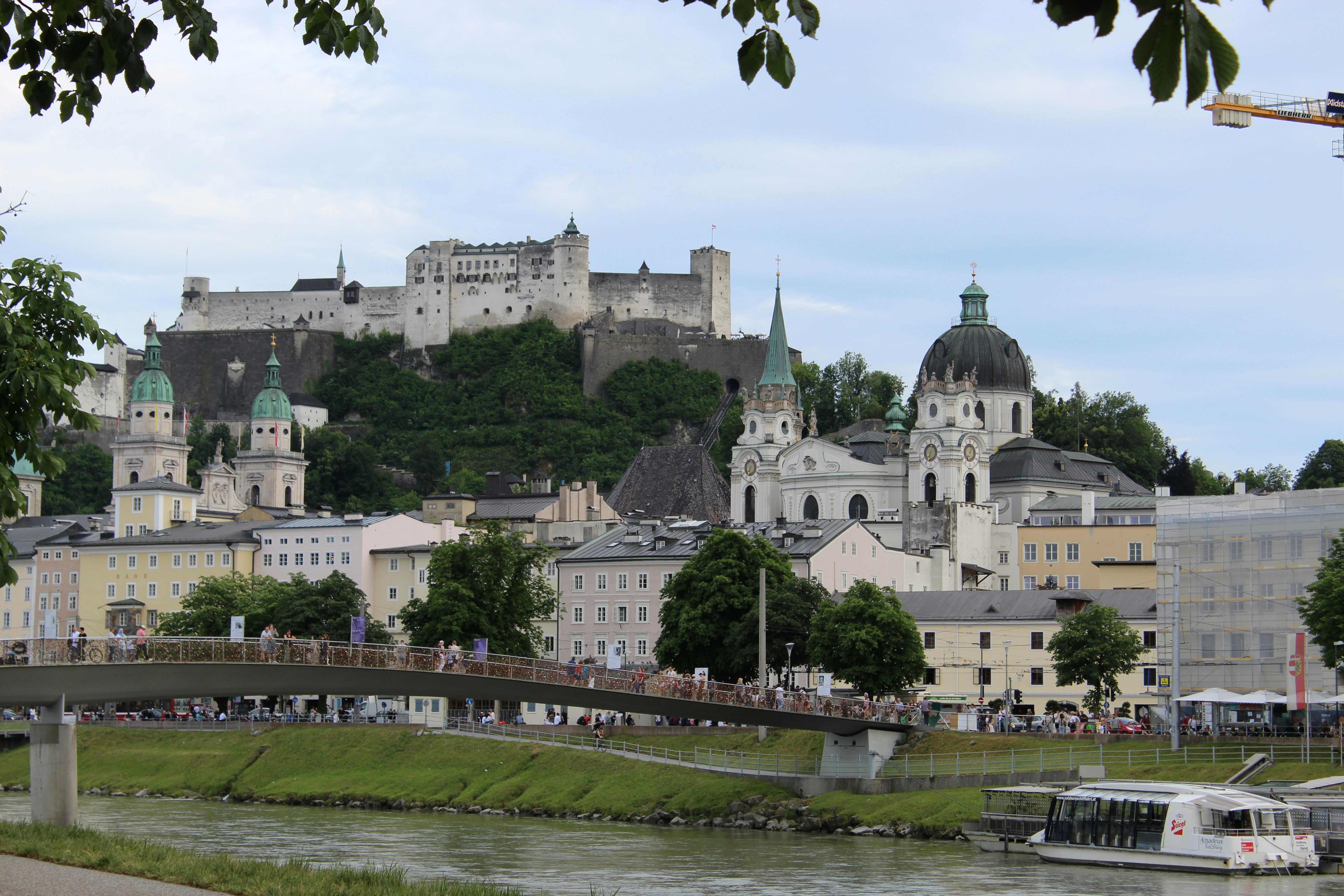 Riverside Fortress: A Quiet Cityscape beneath a Historic Skyline