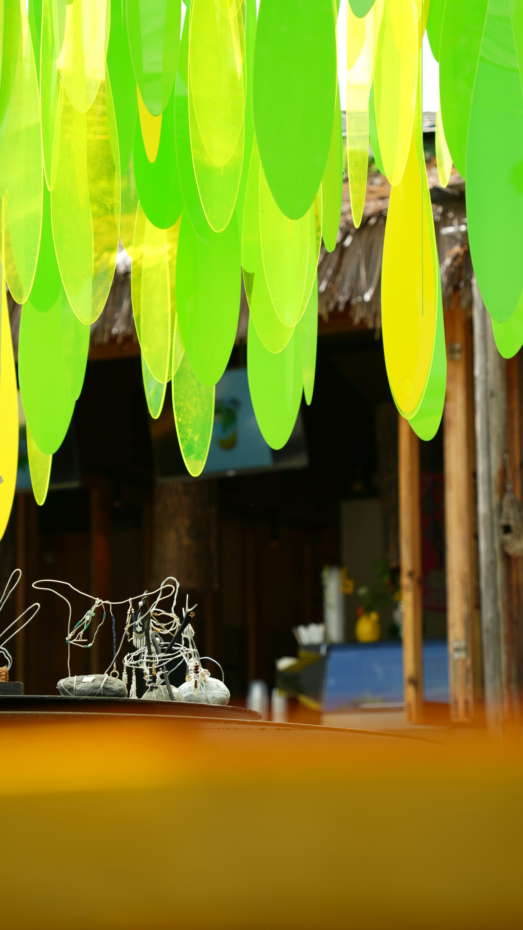 Neon-green Leaves Overhang Above a Rustic Porch