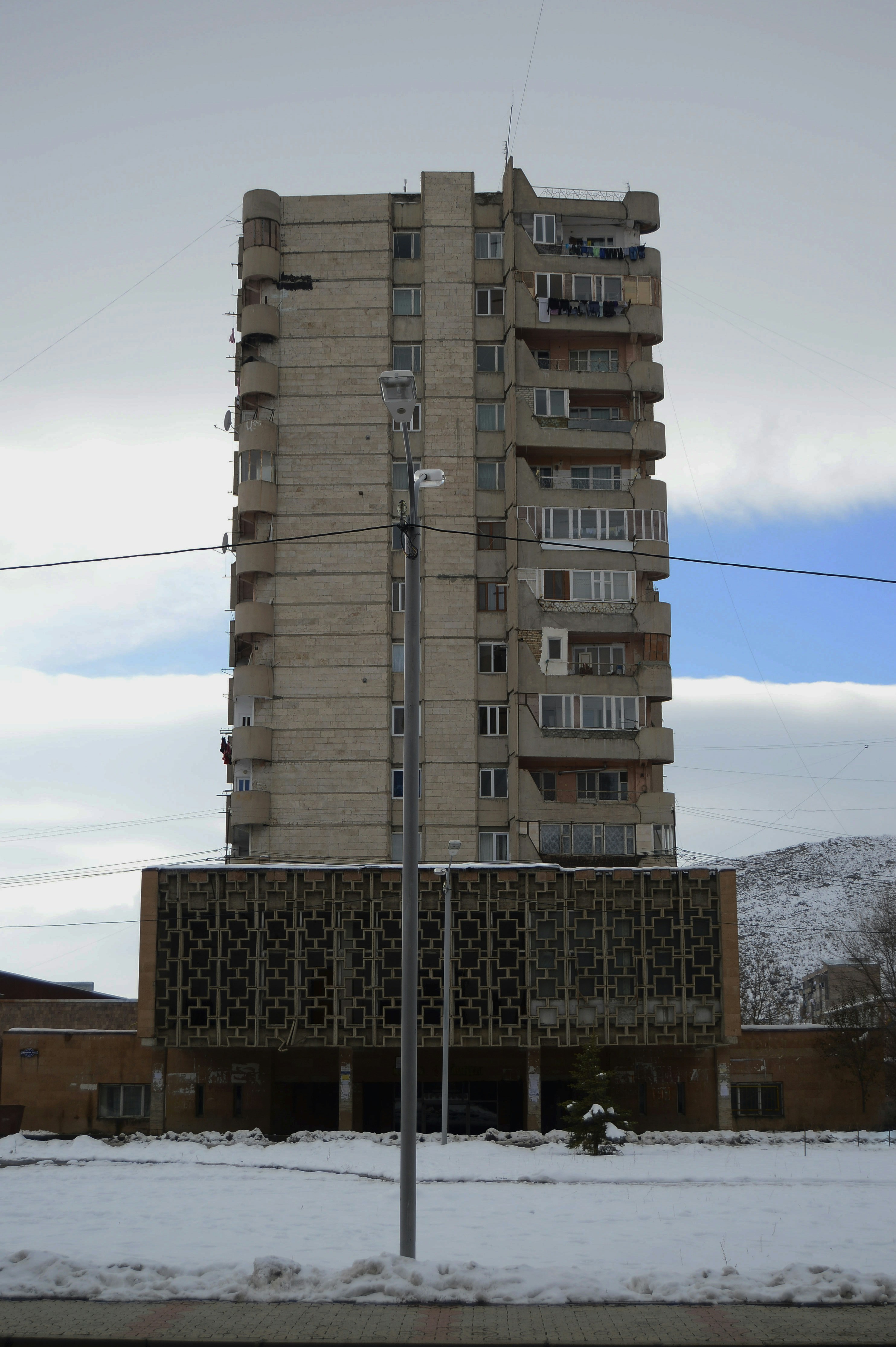 Concrete Highrise Under a Winter Sky