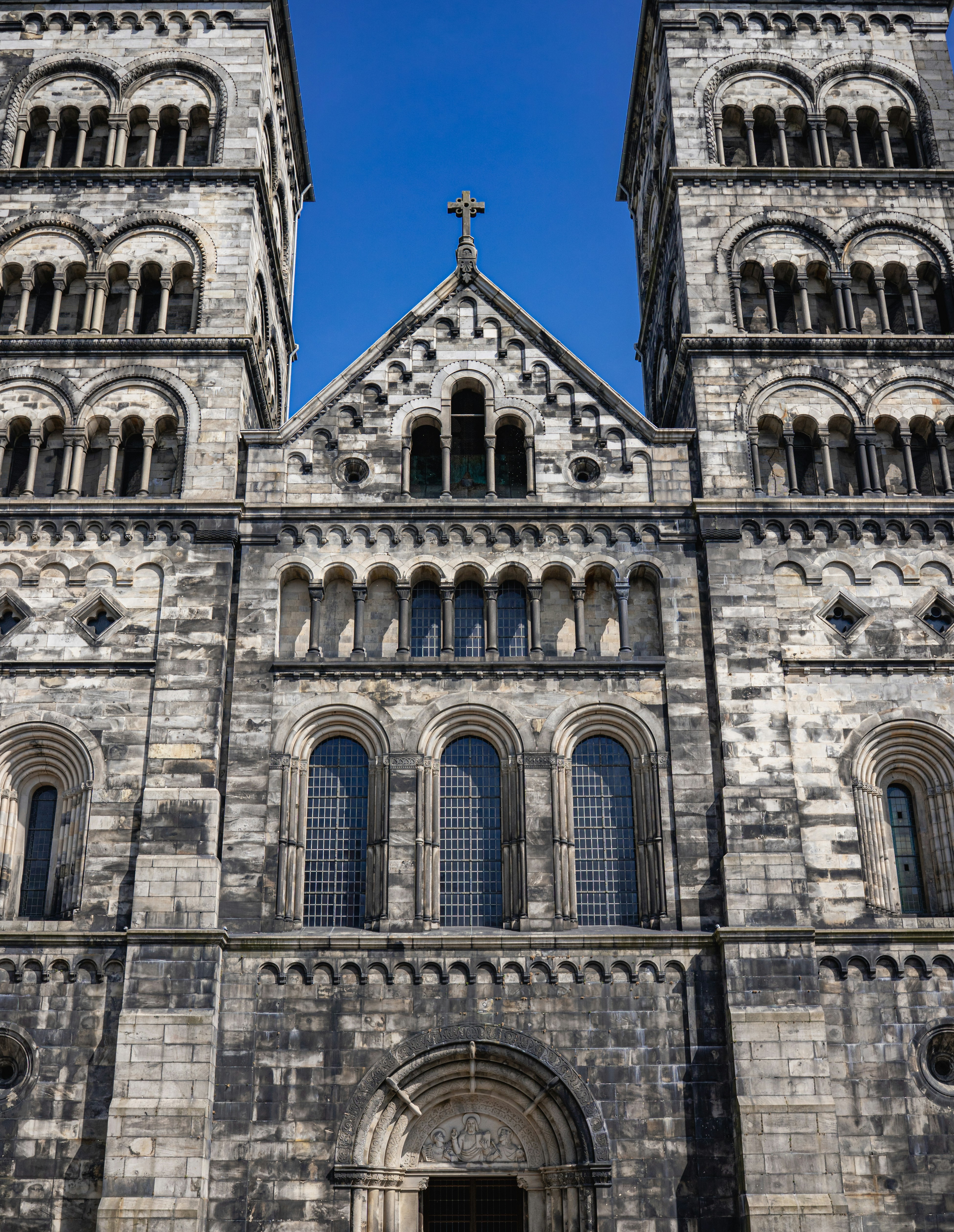 Romanesque Facade in Bold Blue Sky