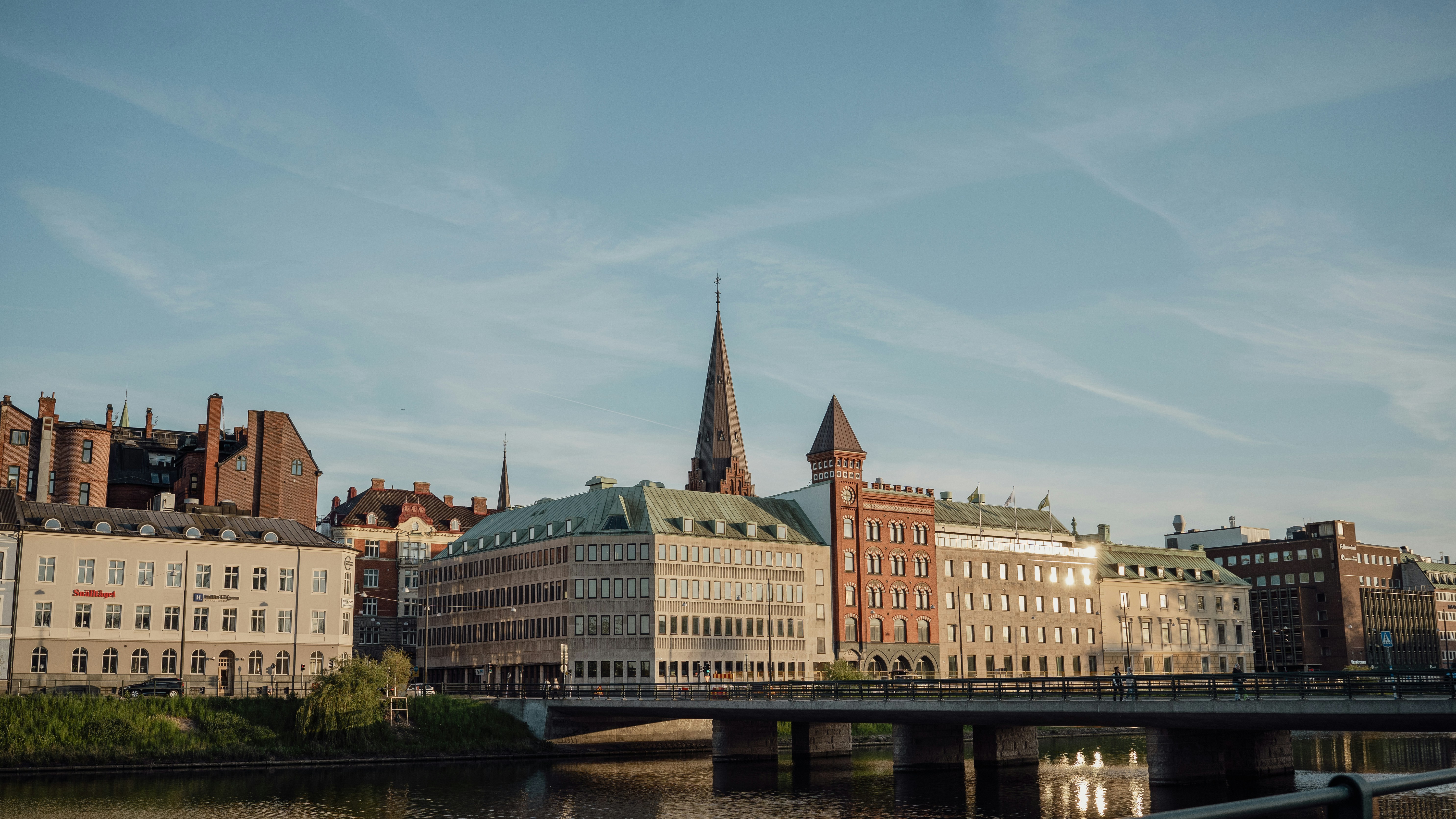 Harbor Palette: Riverside Row of Historic Facades Under a Clear Sky