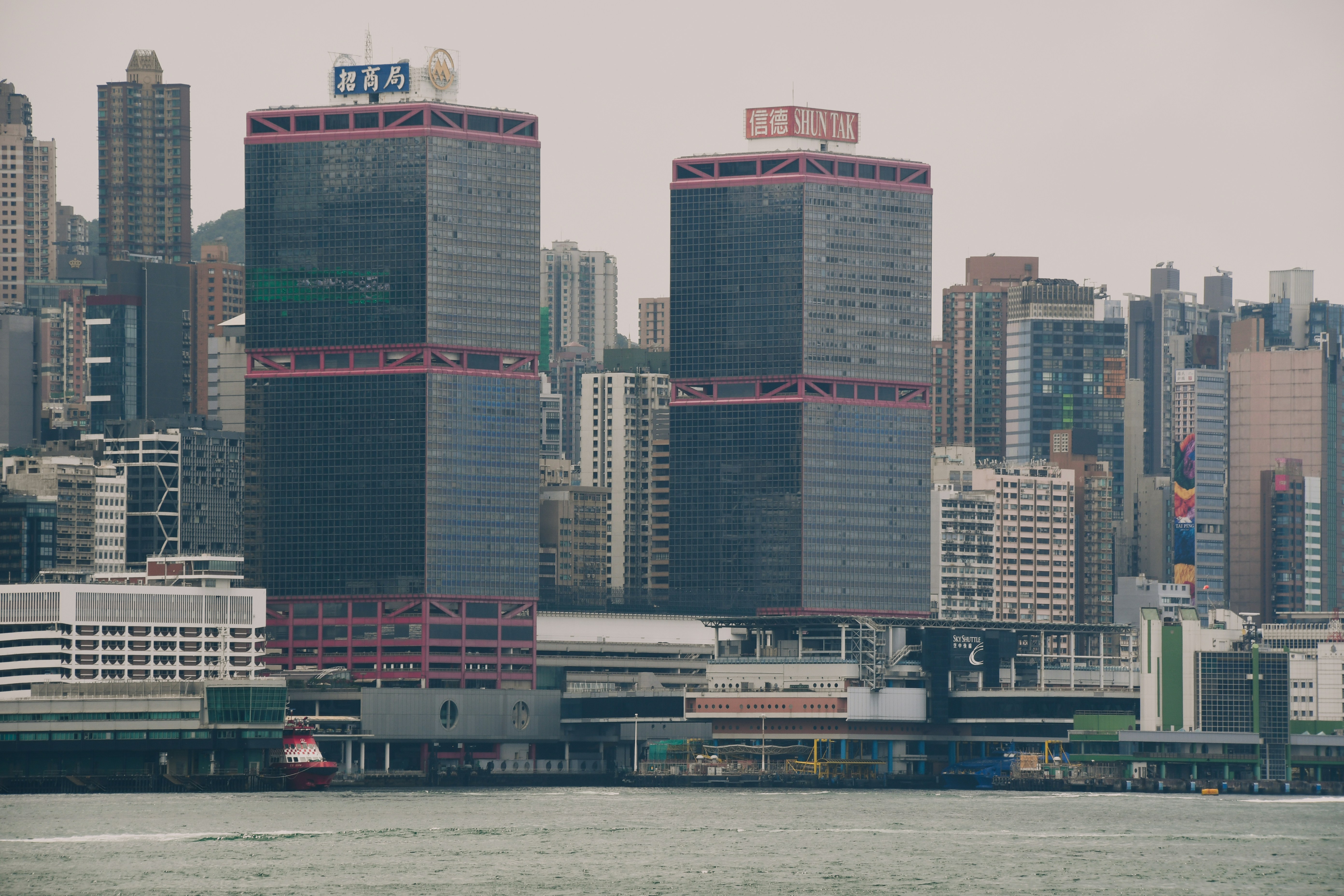 Twin Corporate Towers Over the Waterfront Skyline