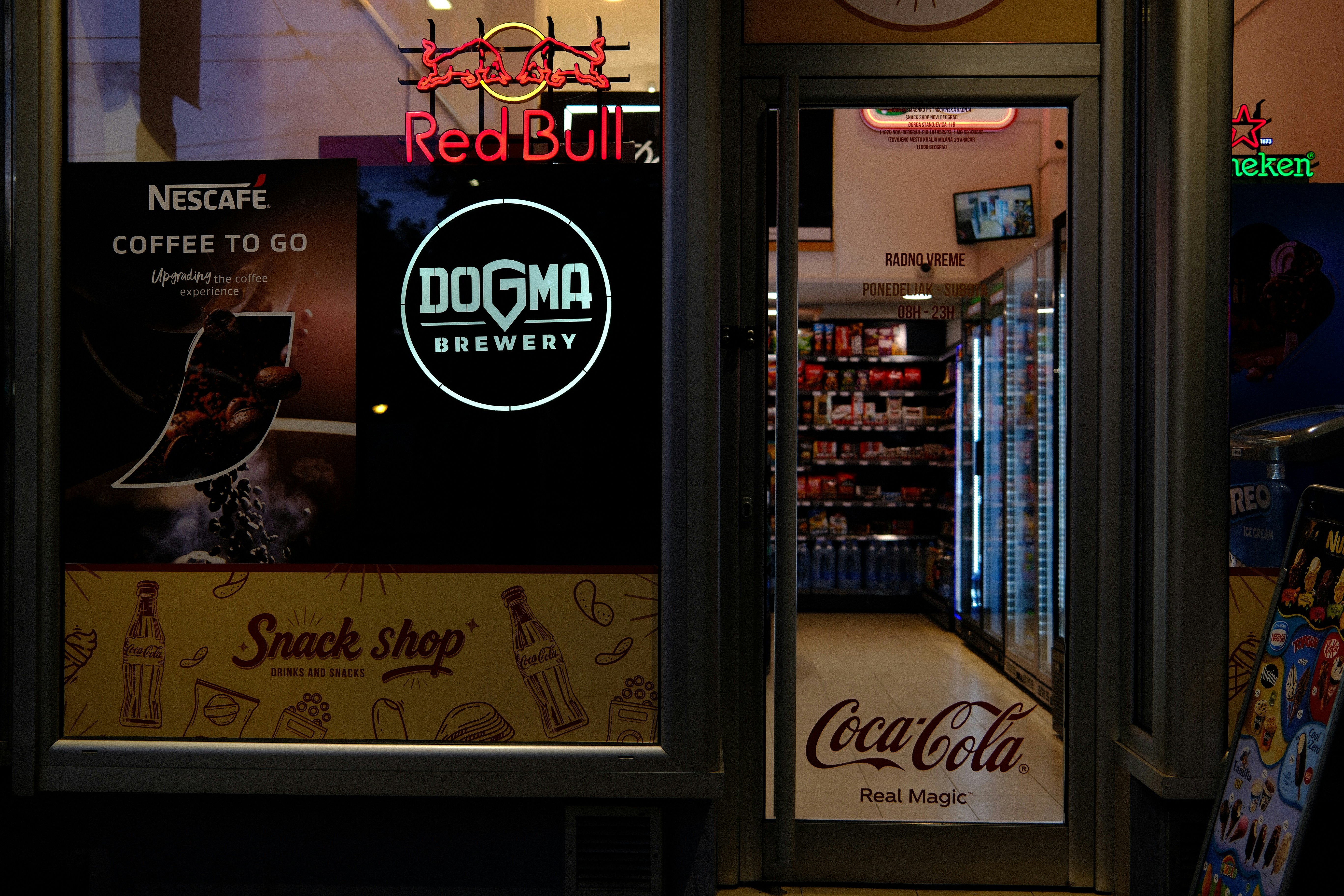Neon Signs and Candy Wall: A City-Face Through a Shopfront Window