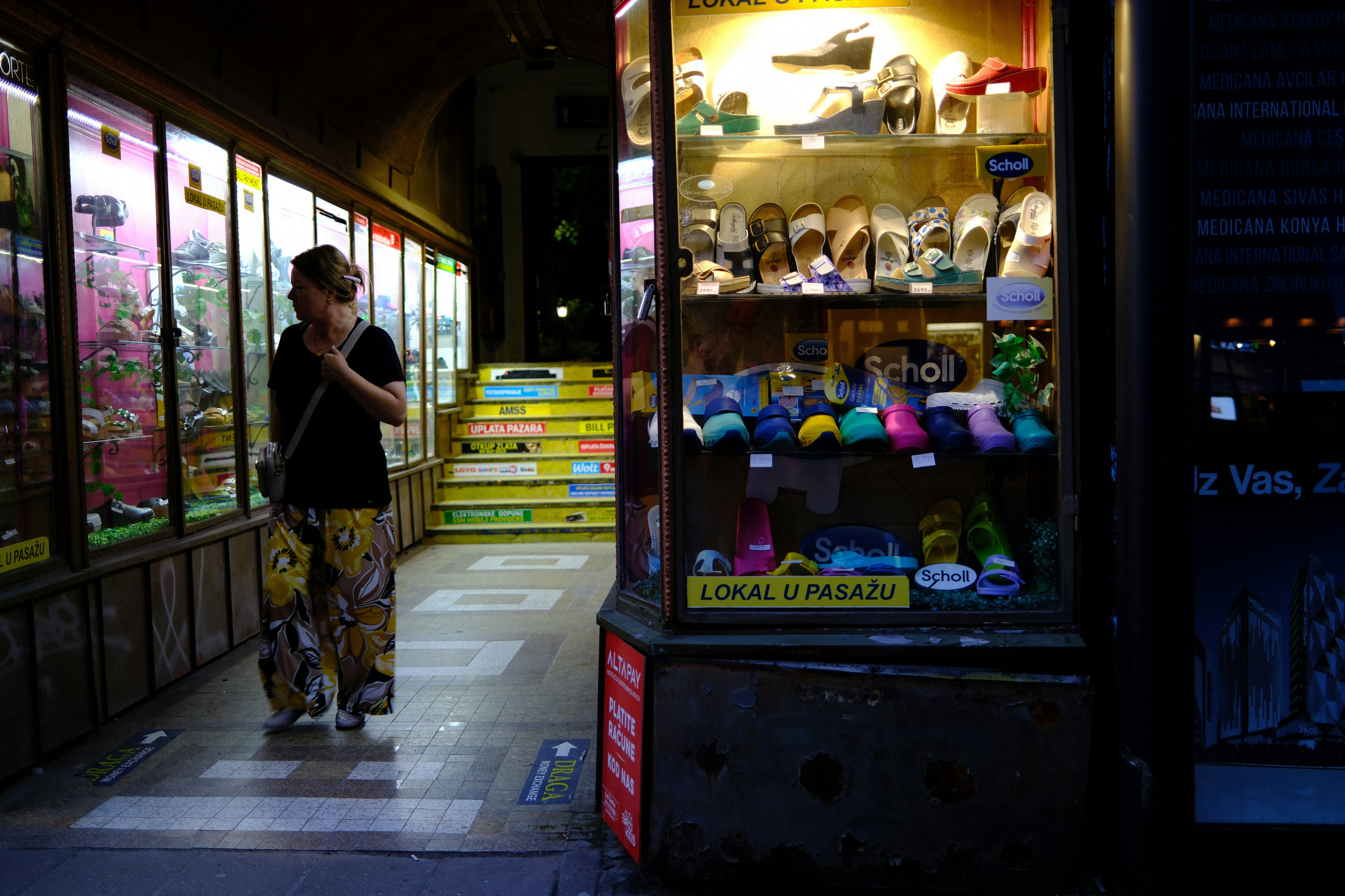 Night Market Echoes: Shoes on Display and a Whispered Walk