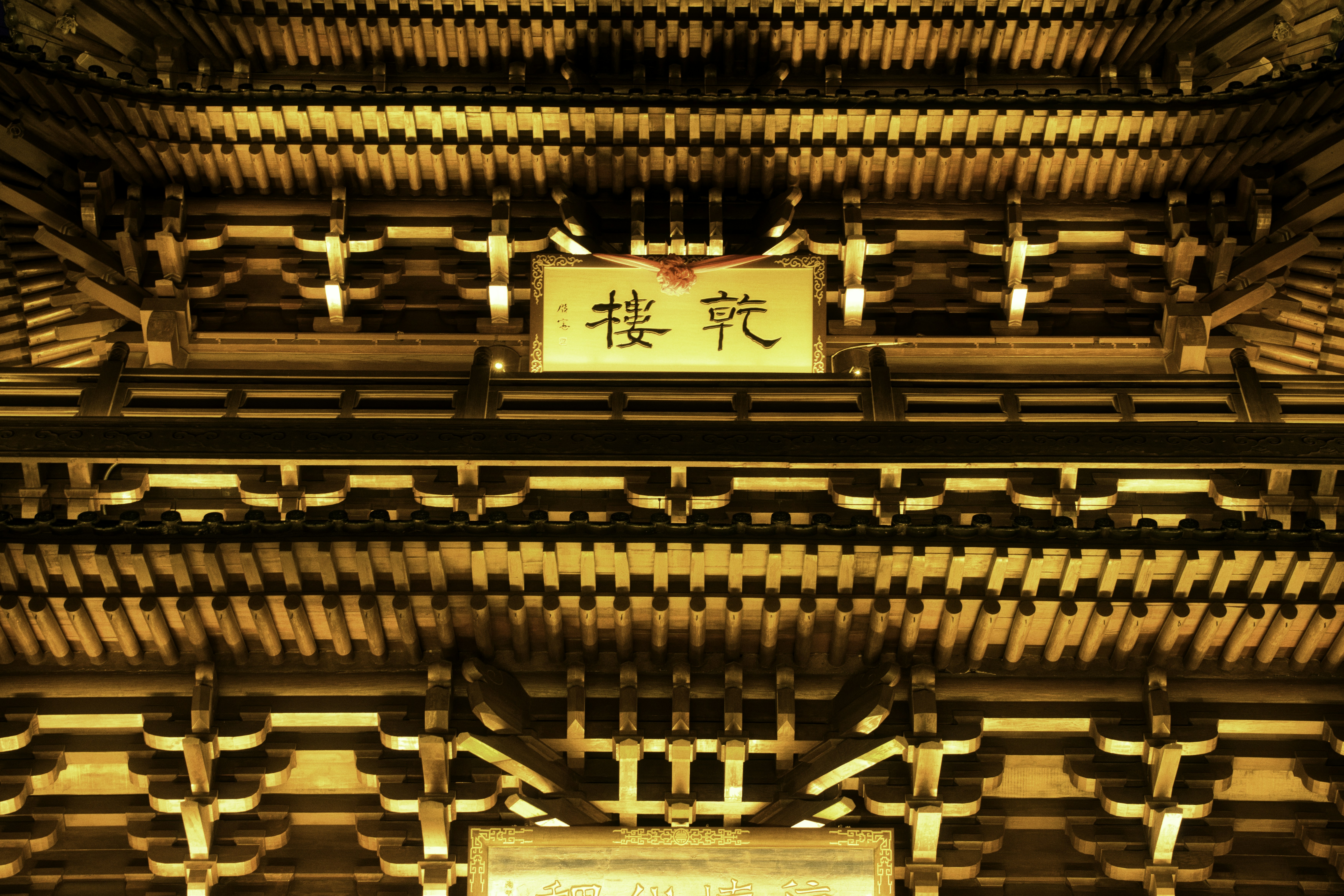 Golden Timber: A Lanterned Crown Over Silent Carved Beams
