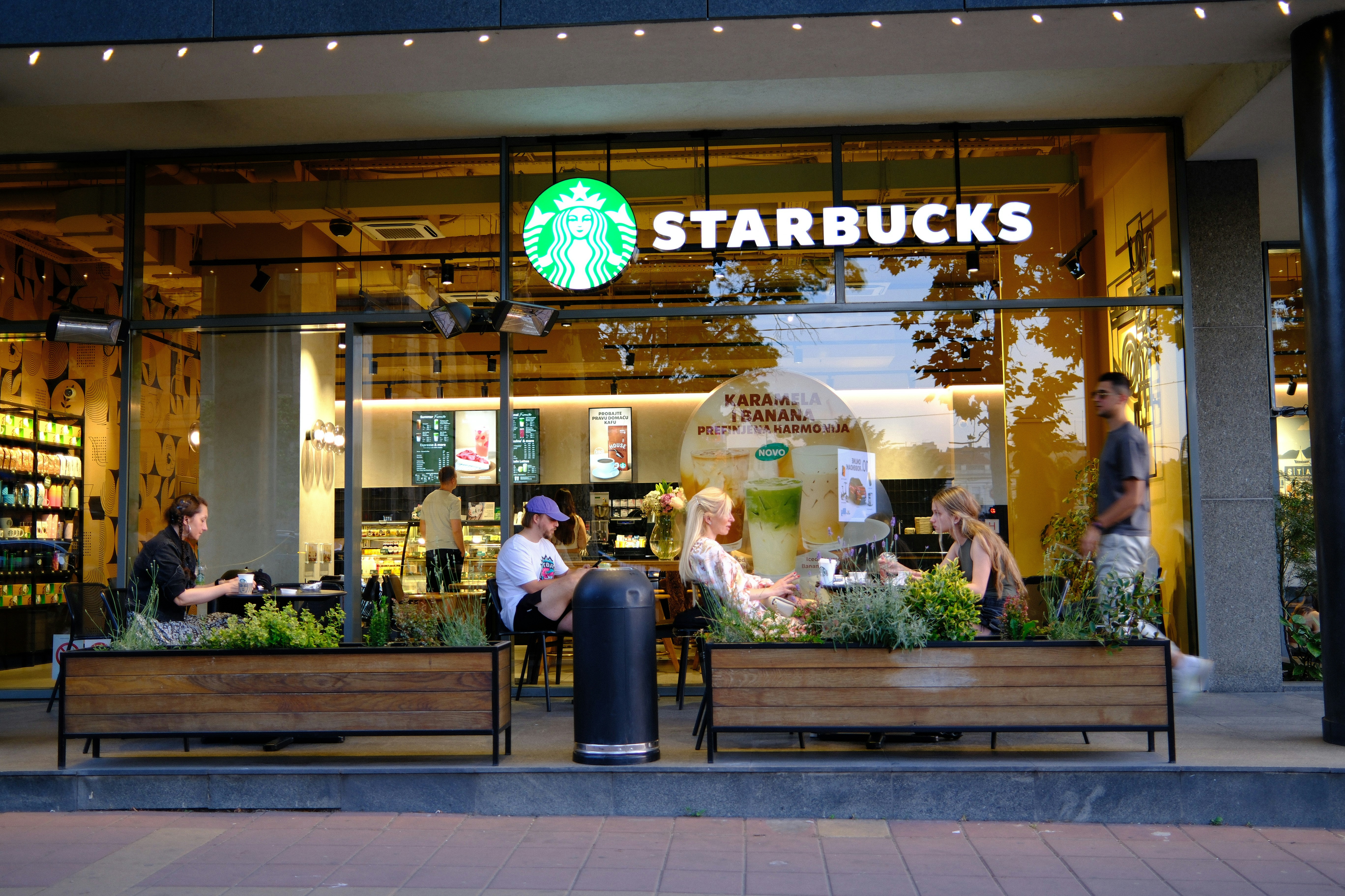Starbucks Glow: Morning Buzz at a Glass-Front Café