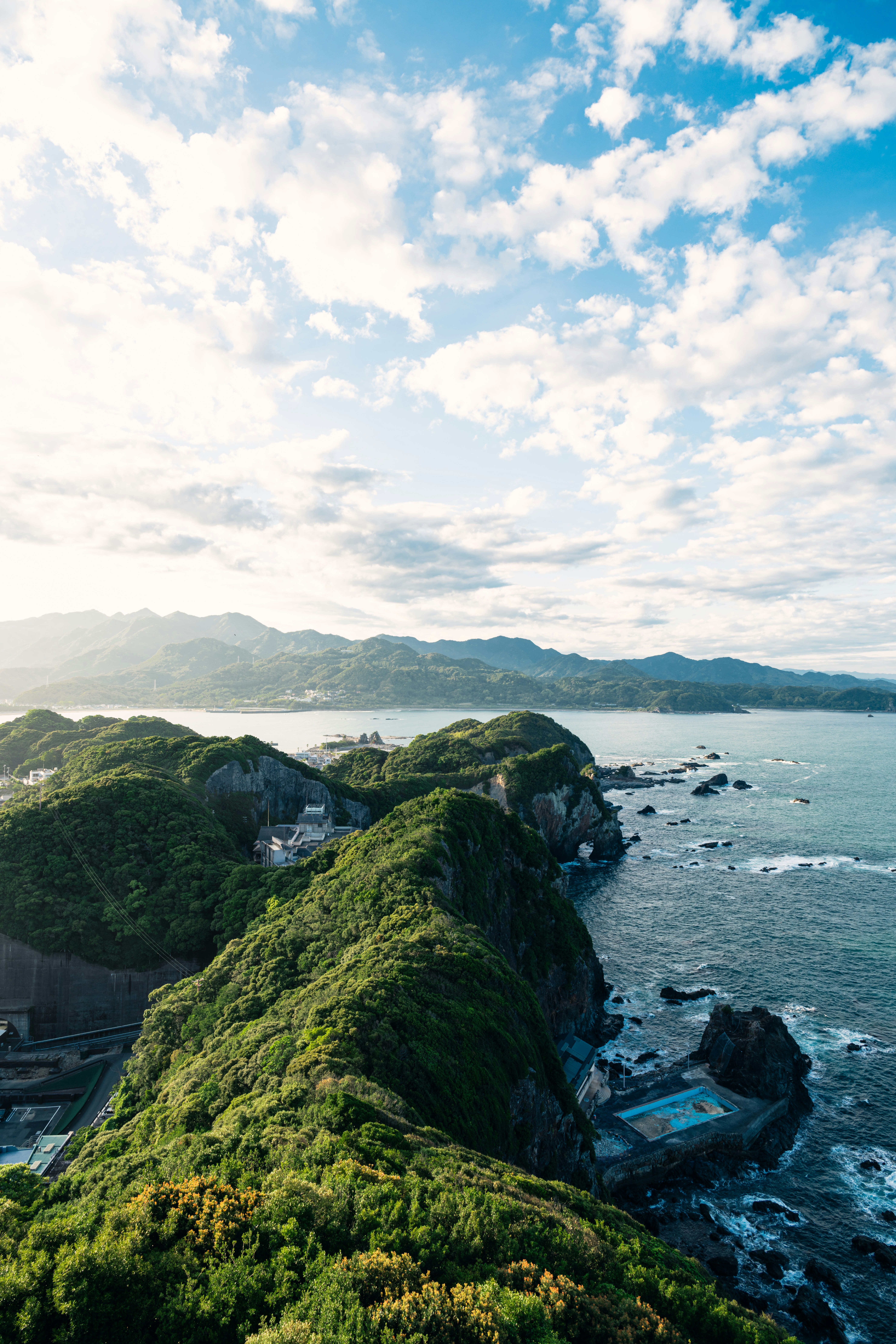 Verdant Promontory Embracing the Sea