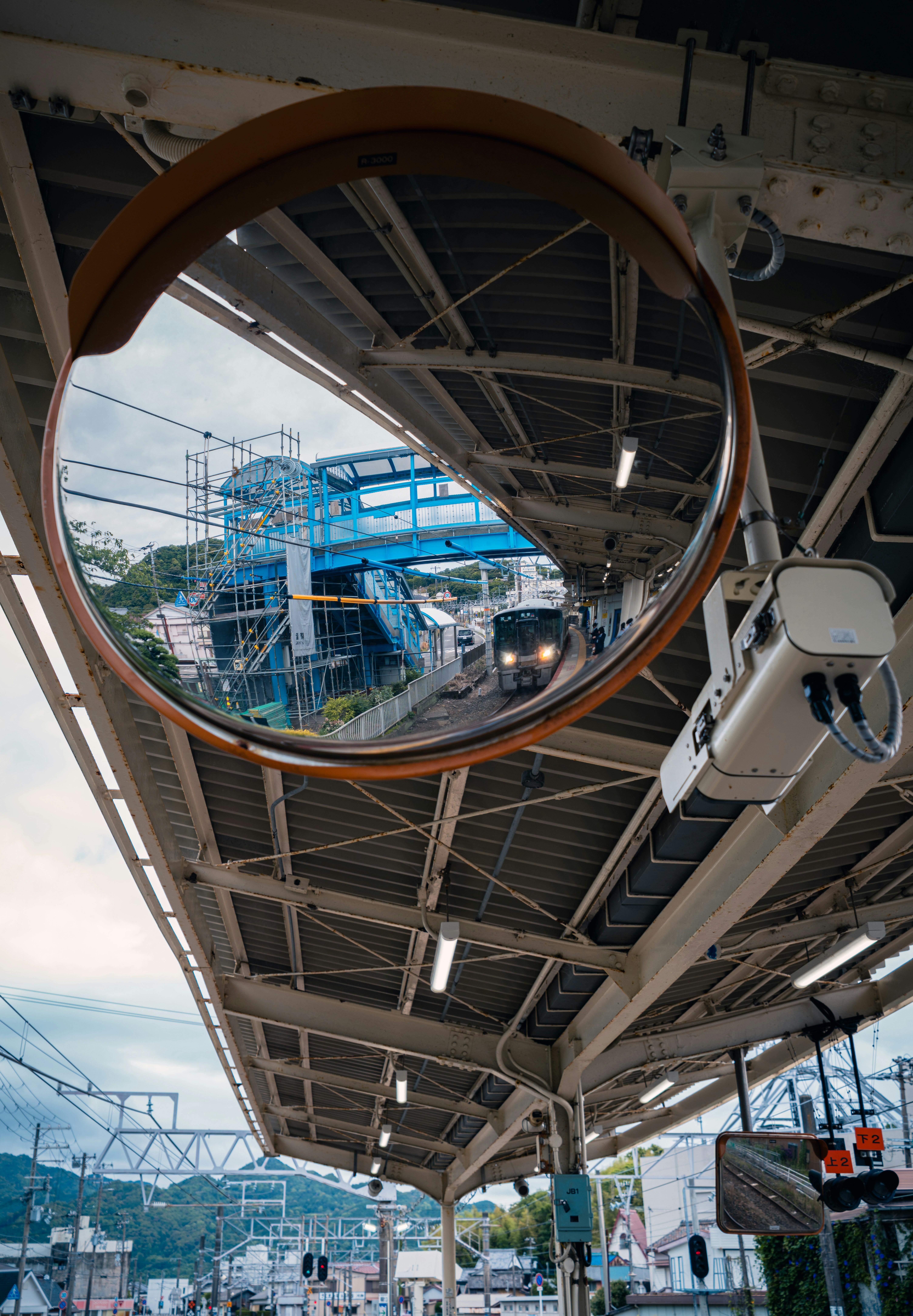 Through the Circular Window: A Railcar's Gaze on the City