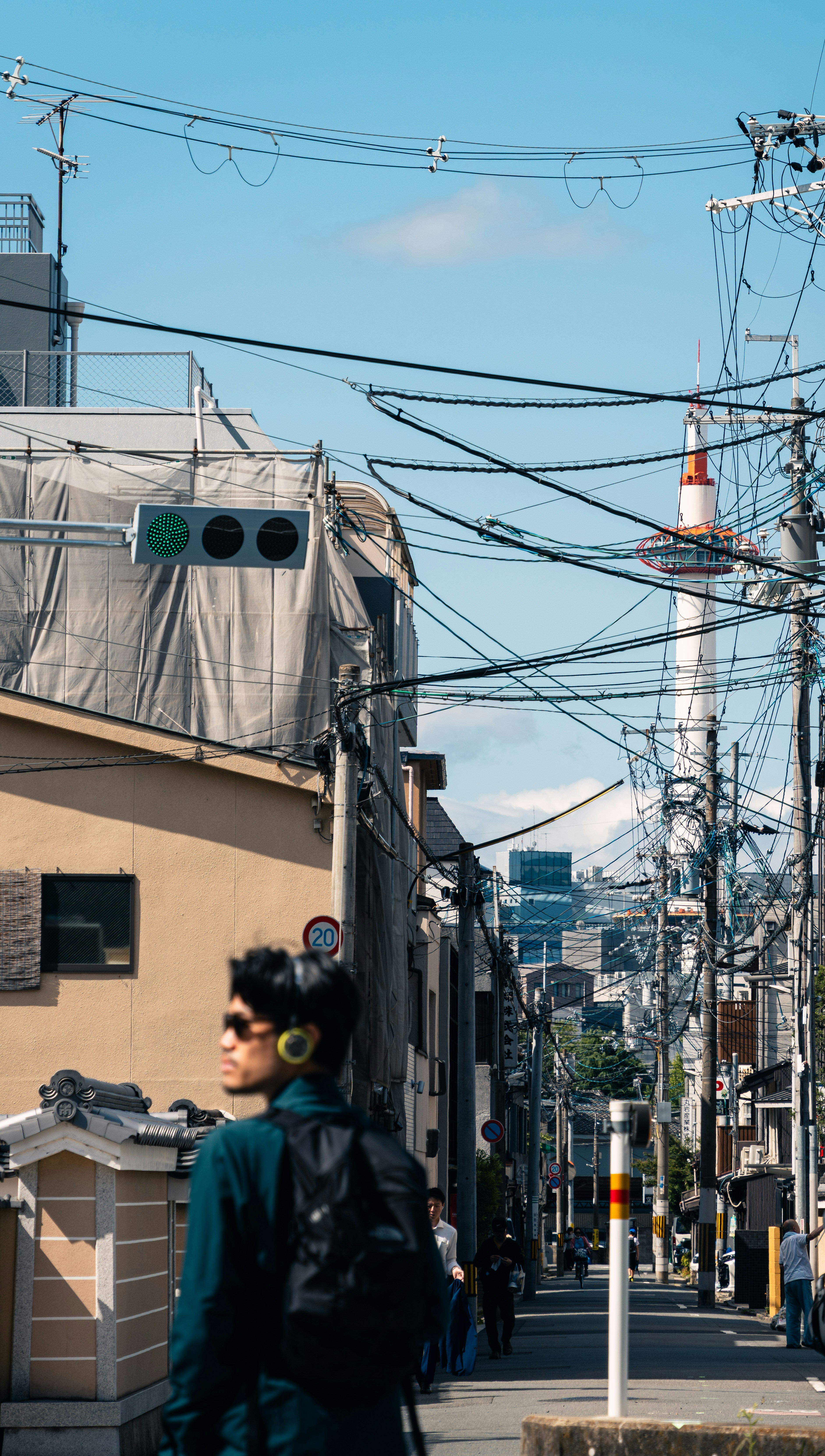 Urban Threadscape: A Street Speckled with Wires and Motion