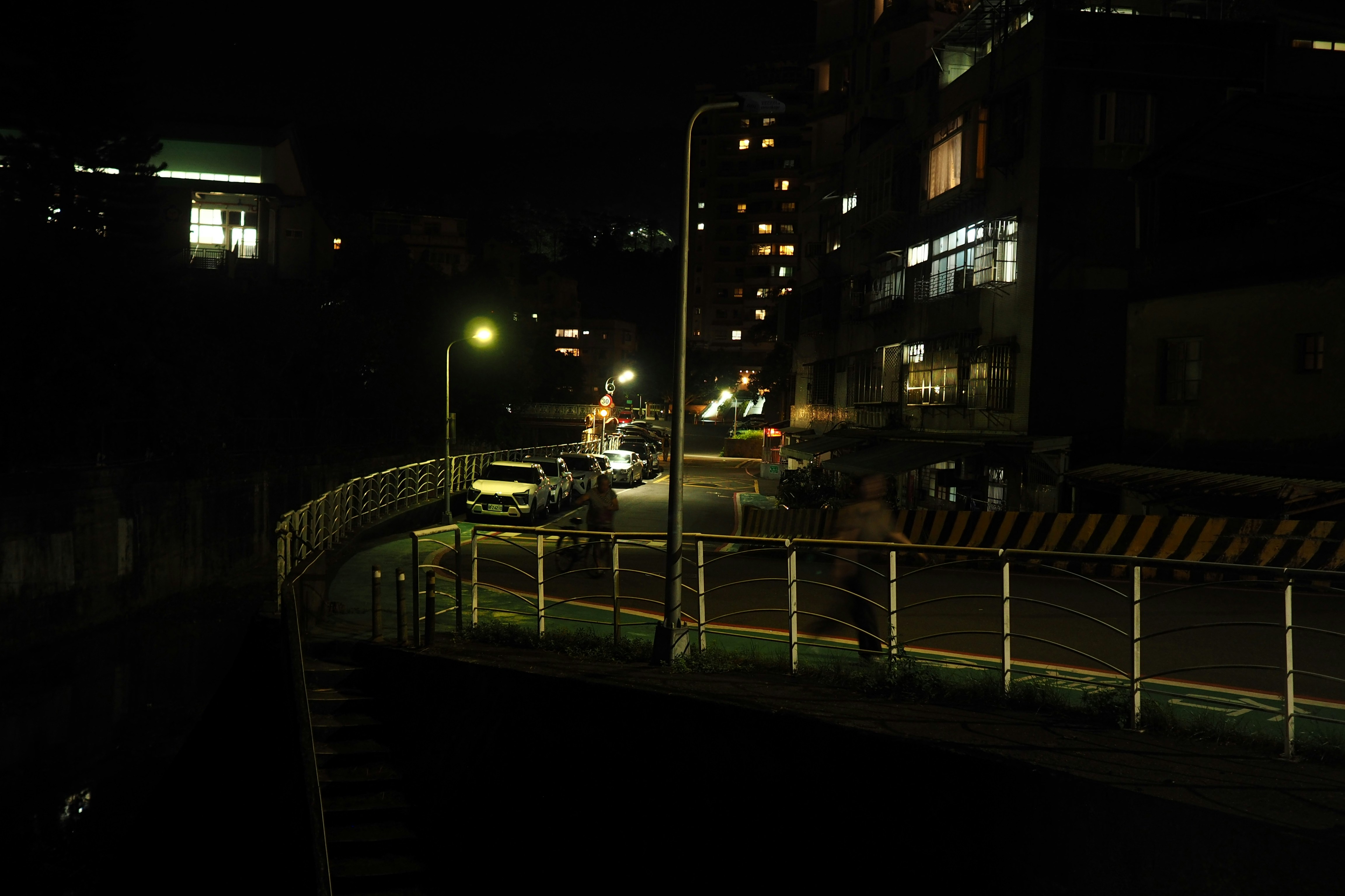 Night Ride past a Quiet Overpass