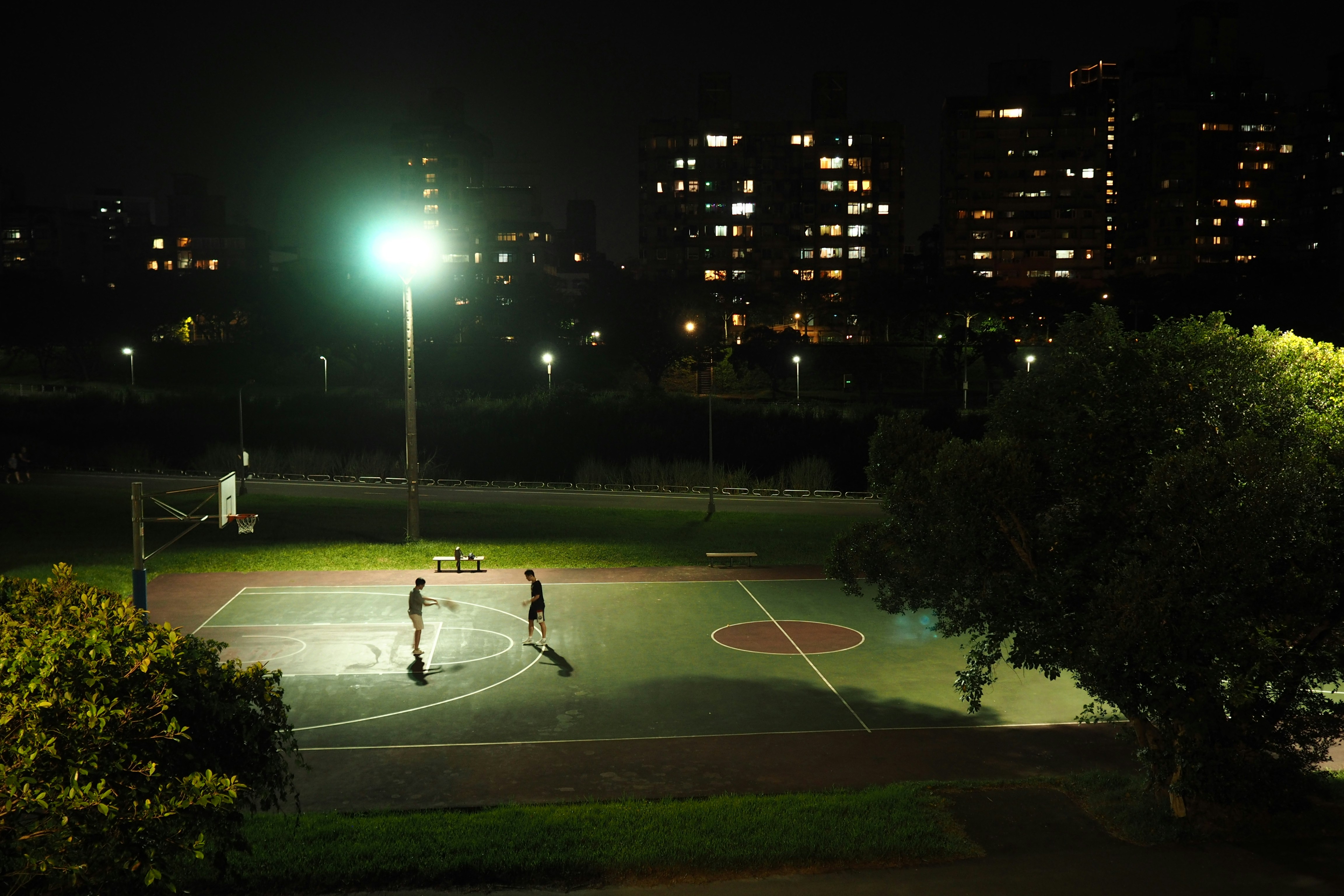 Midnight Pick-Up on a Quiet Court