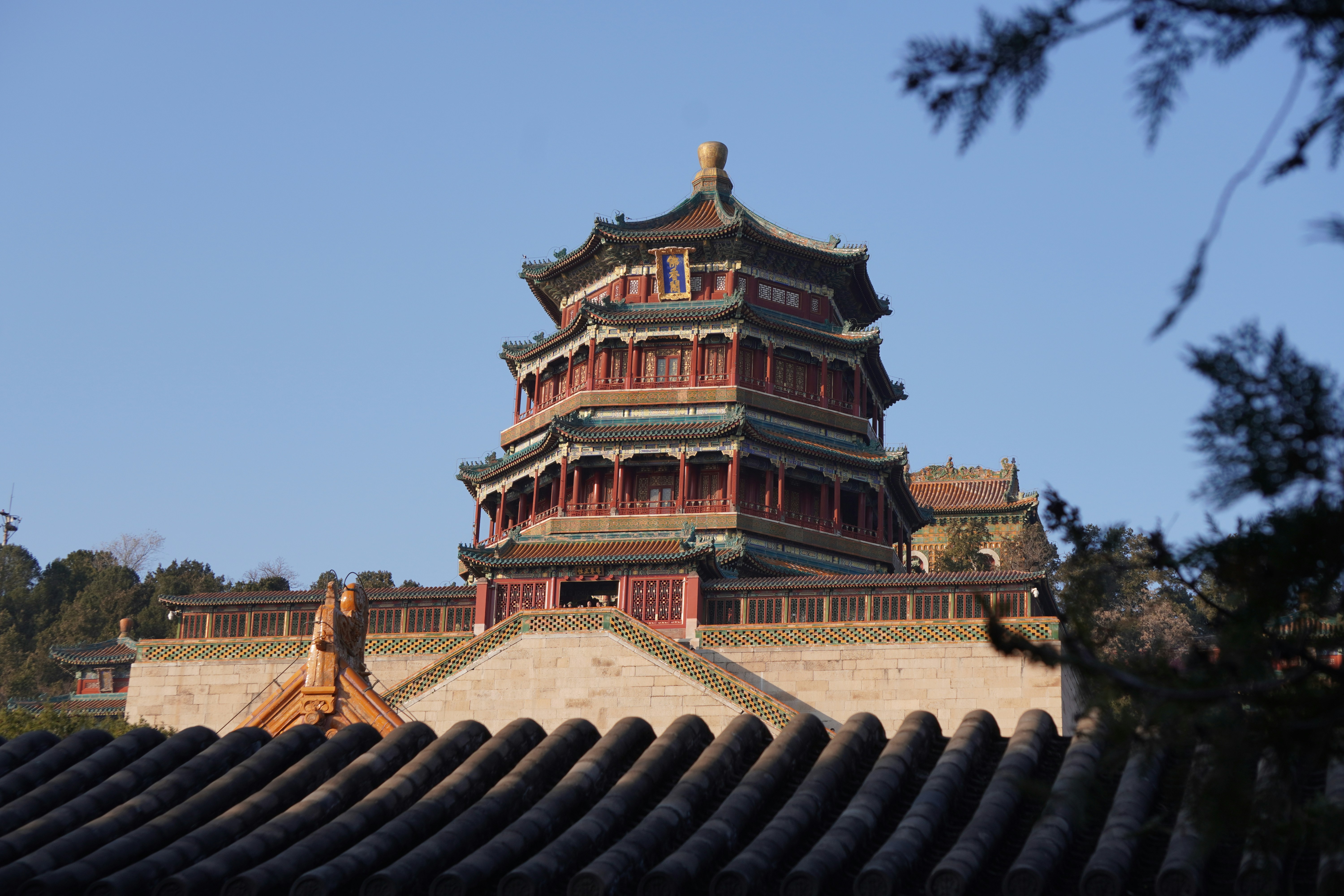 Five-Tiered Temple Rising Above Traditional Rooftops