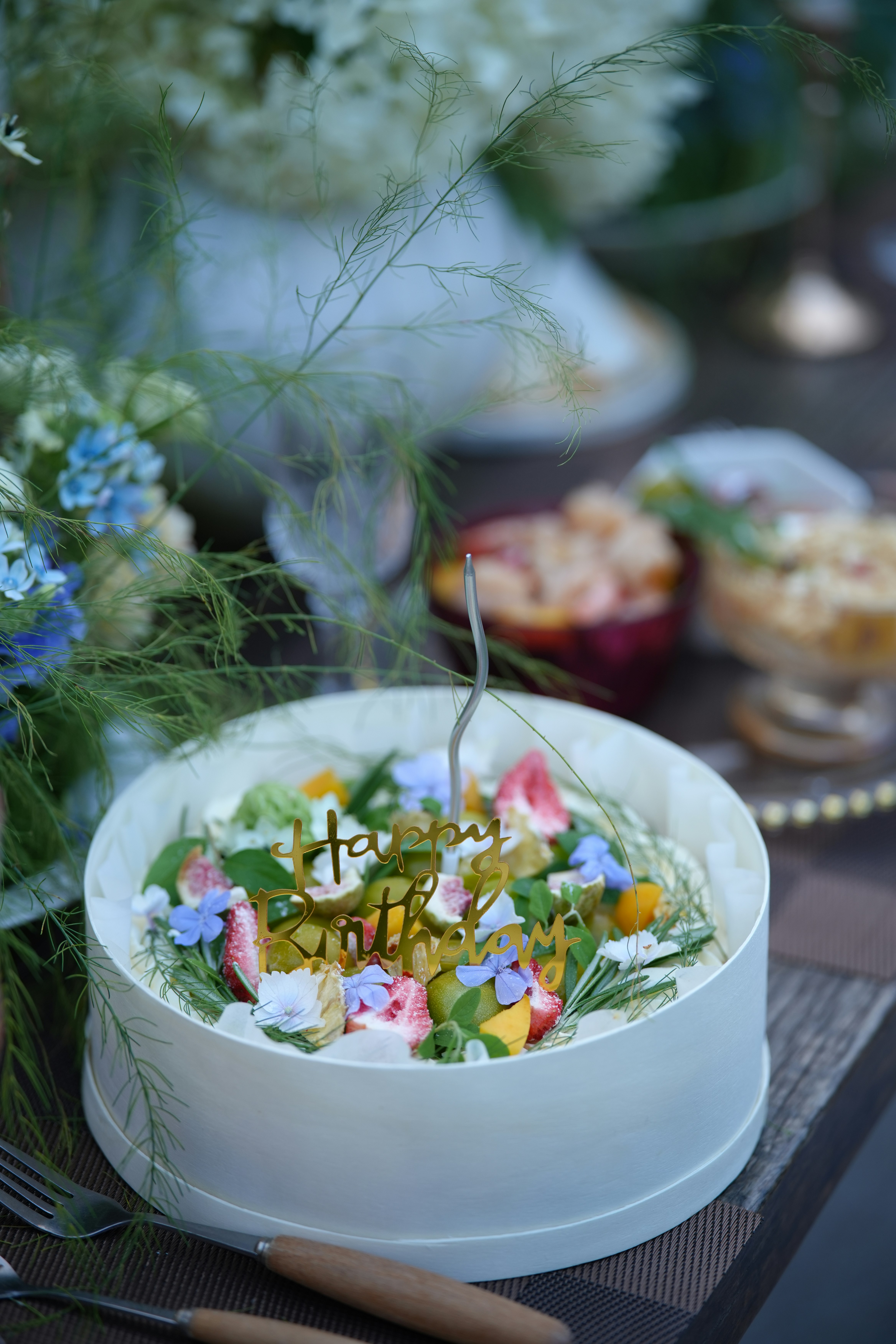 Nostalgic Birthday Cake at a Garden-Table Celebration