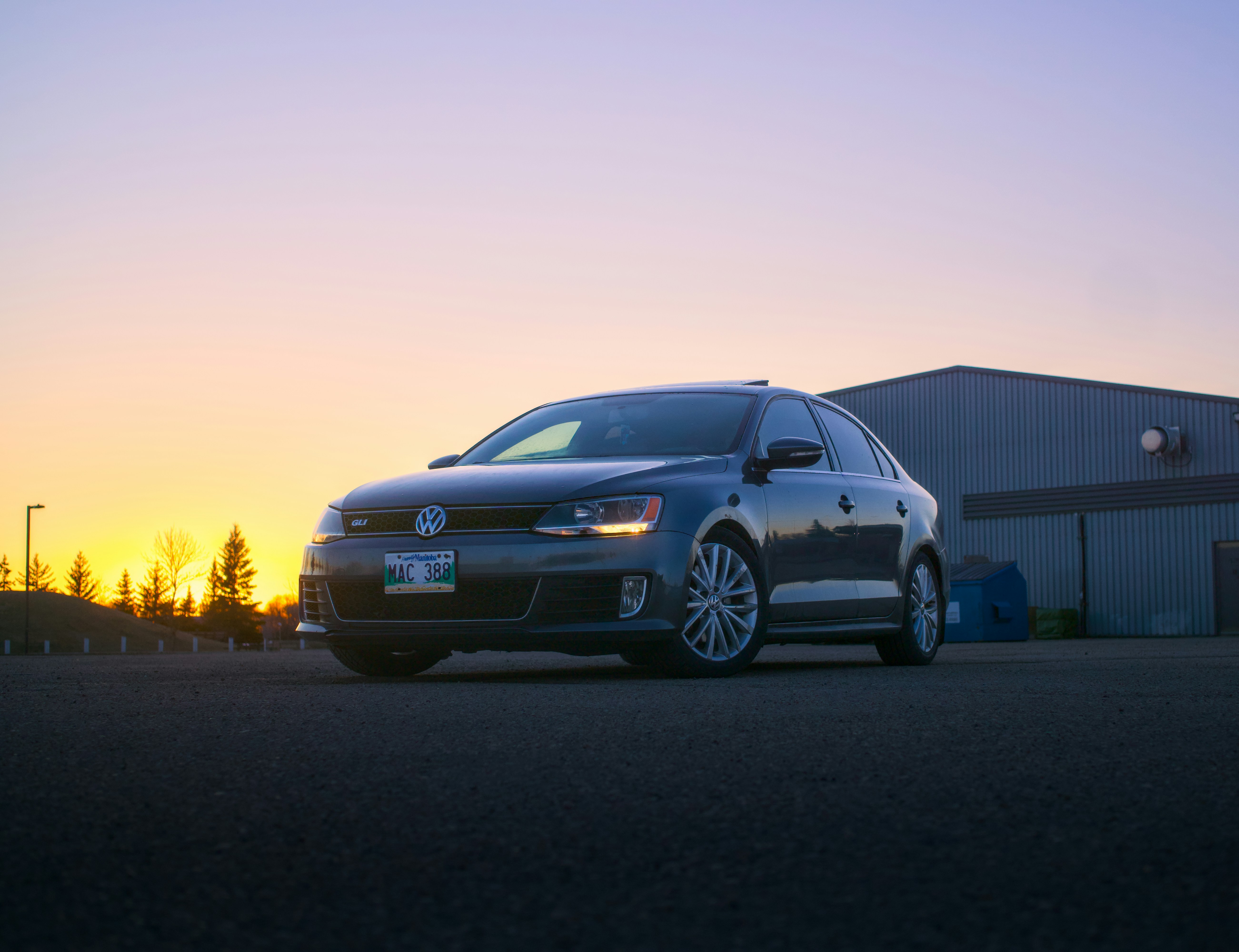 Sunset Stance: A Low-Angle Stalwart Volkswagen in Quiet Parking