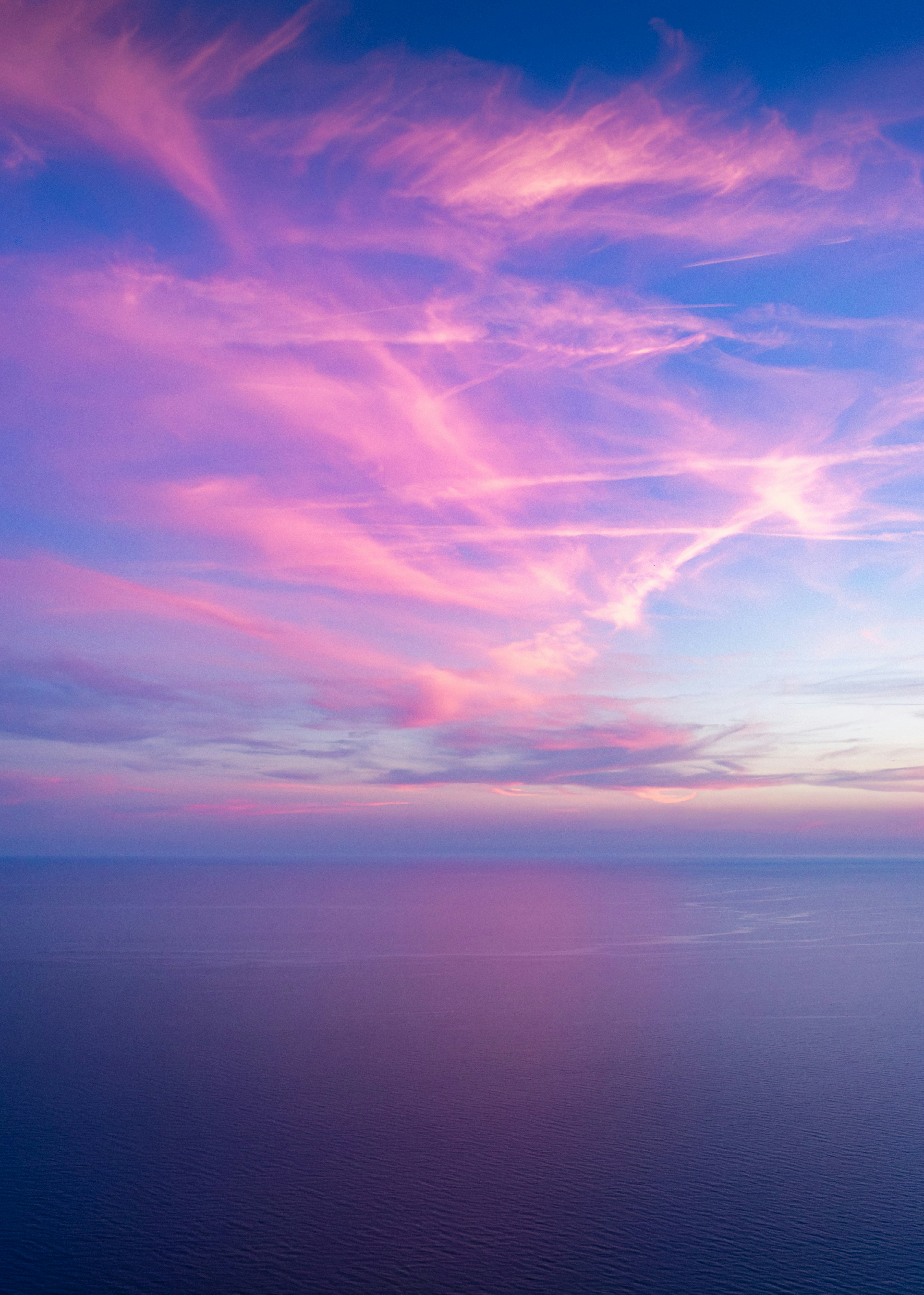 Pastel Convergence Over a Quiet Ocean