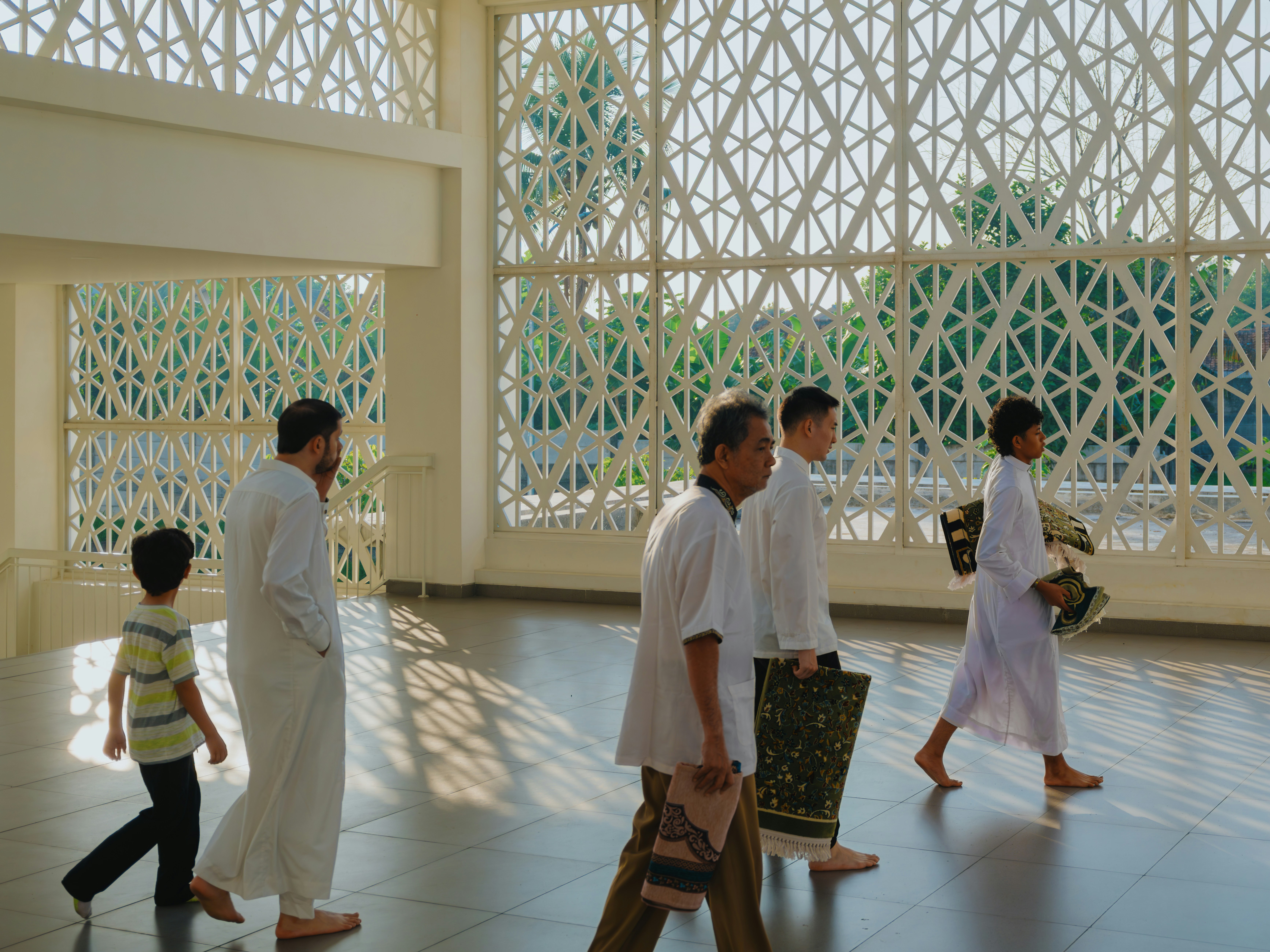 Pilgrims in a Sunlit Gallery Bordering Geometric Silence