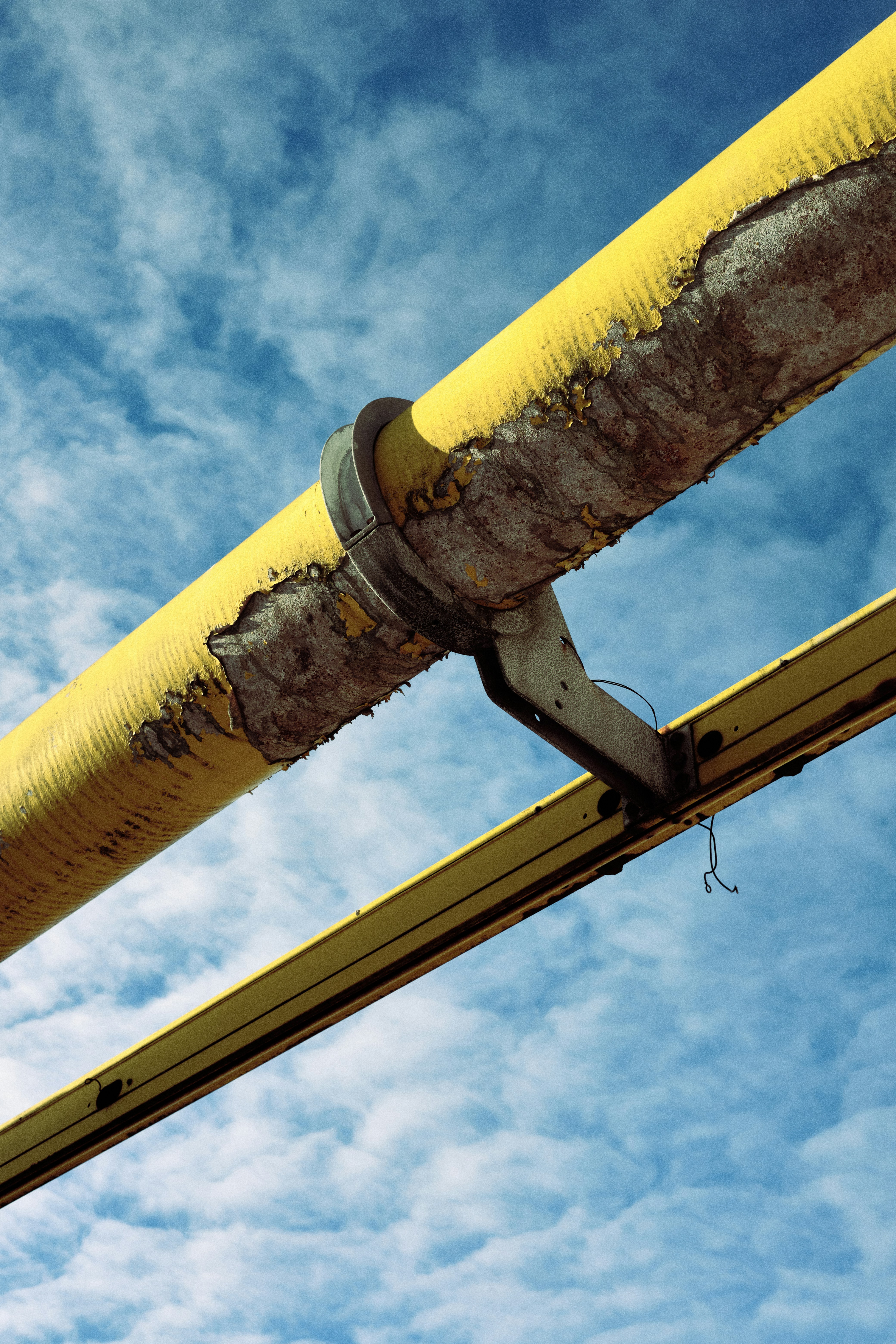 Yellow Pipeline Against a Clear Sky
