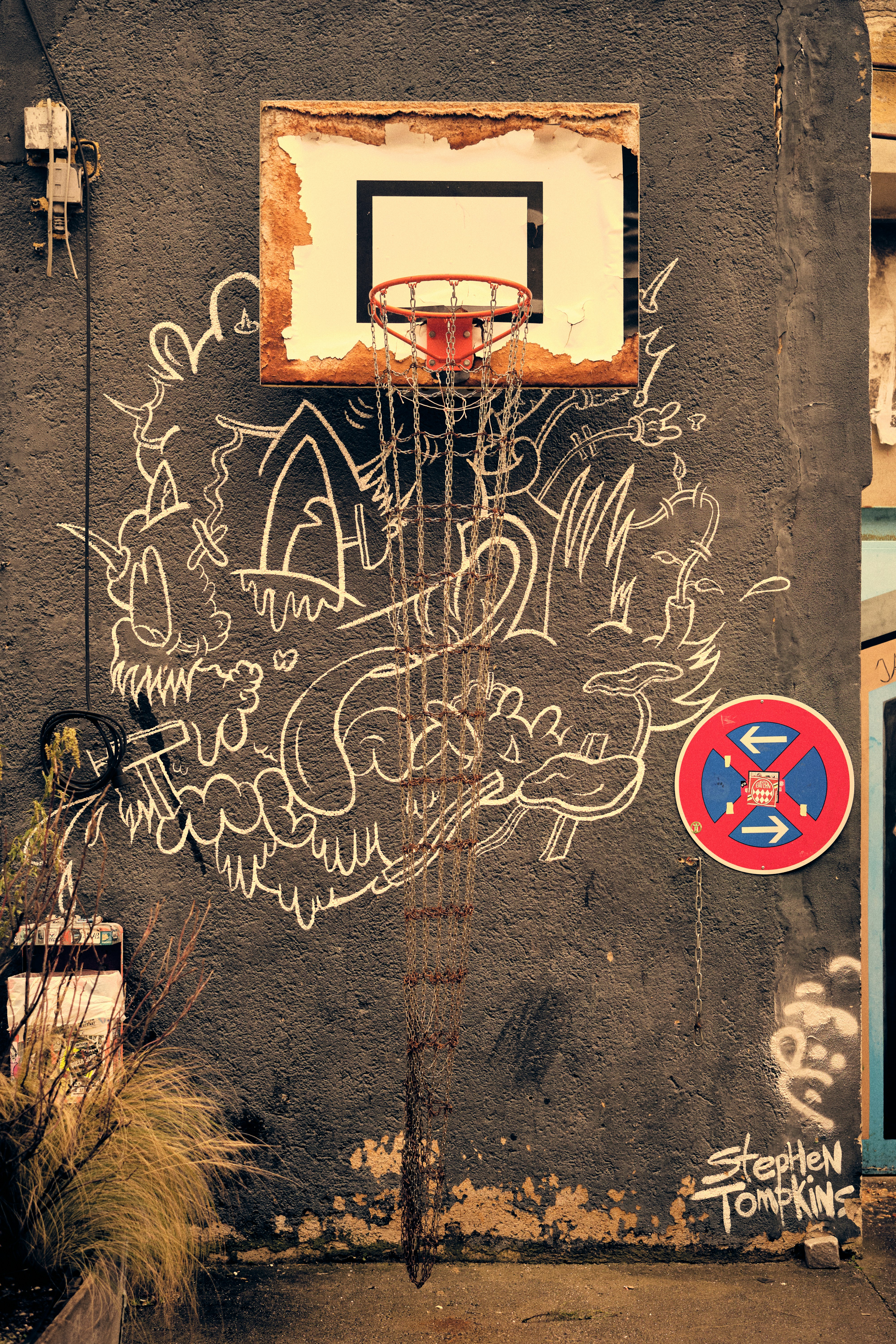Basket of Lines: Graffiti Basketball in a Weathered Wall