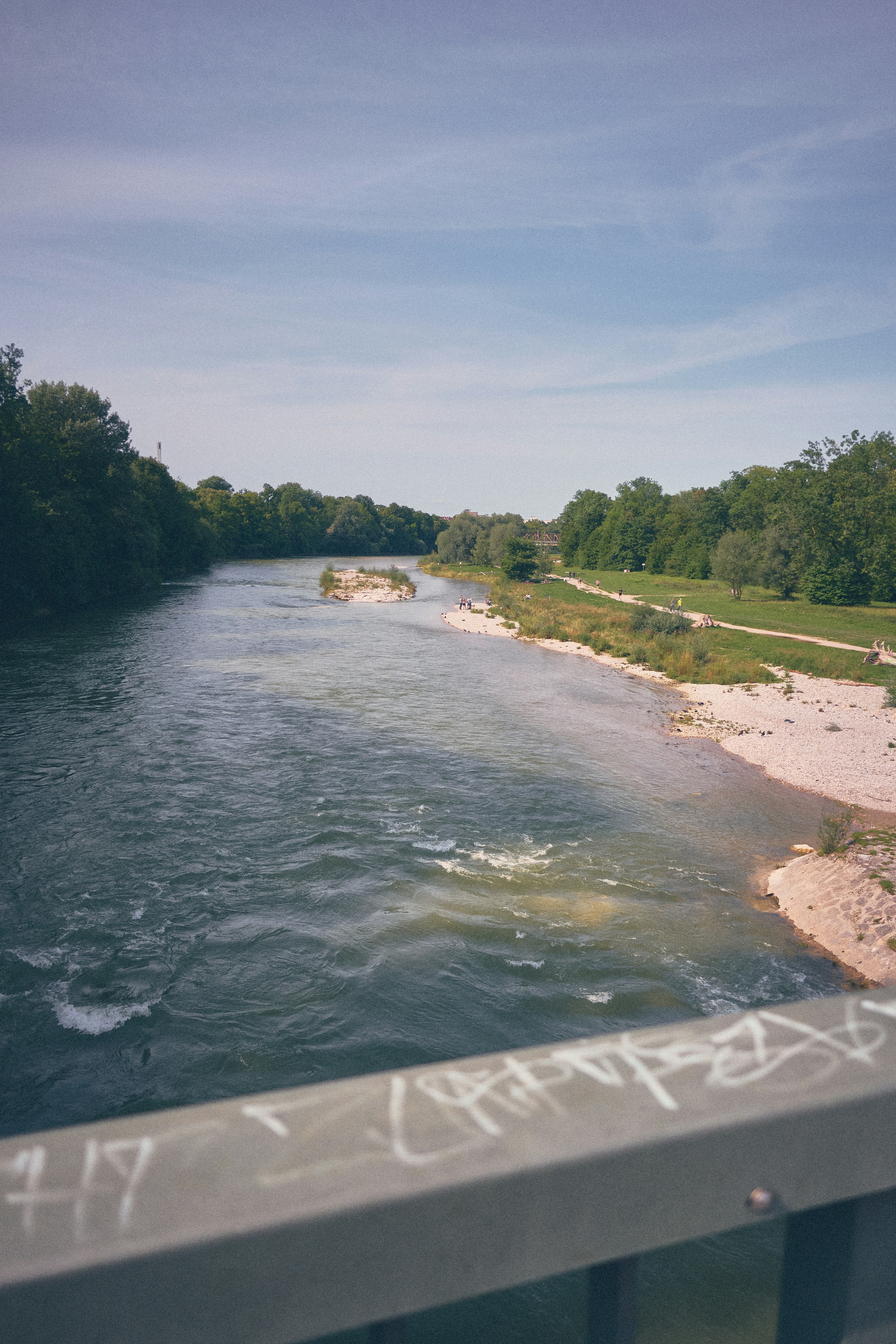 Riverbend Overlook: Light, Water, and a Graffitied Rail