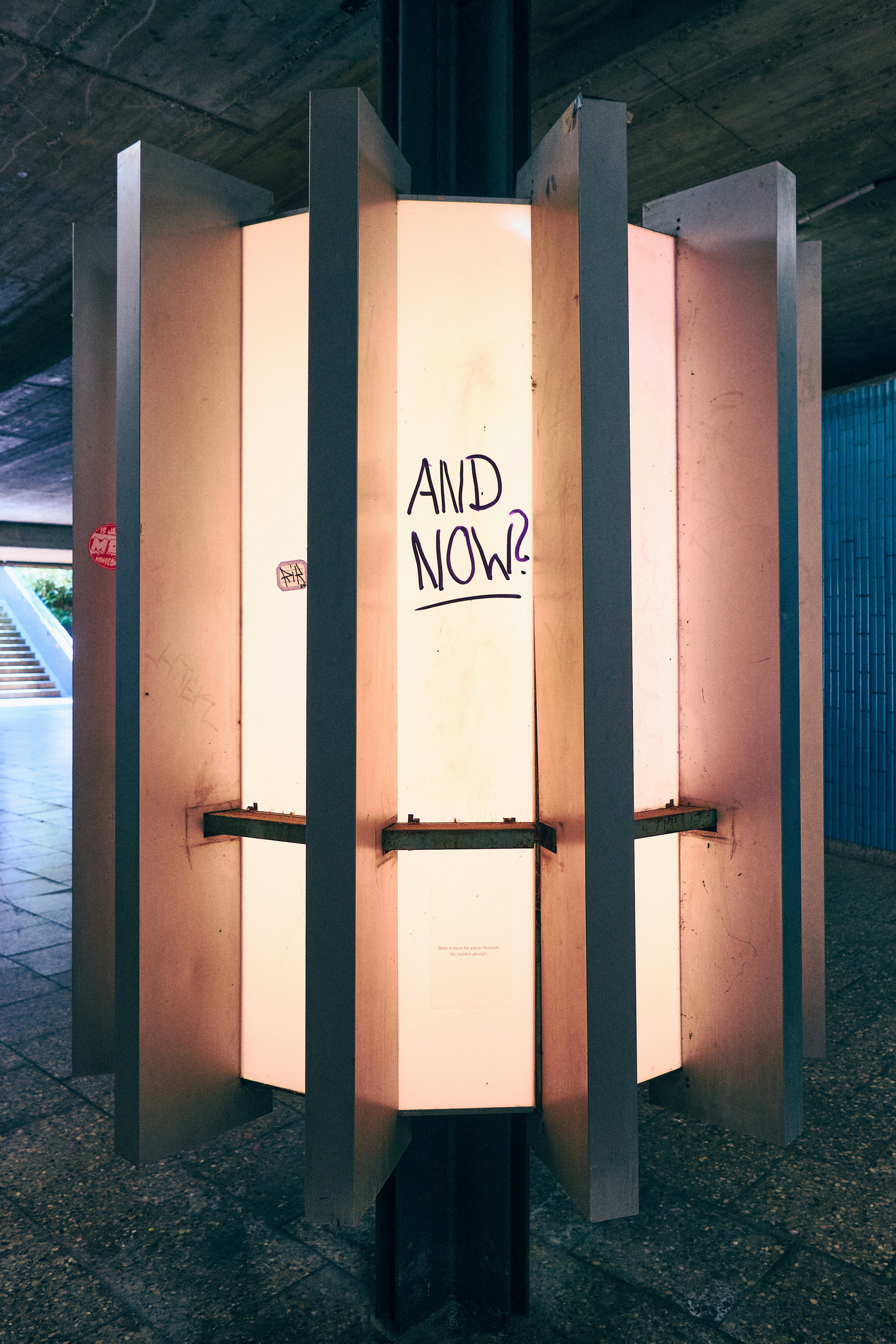 Lighted Column Obelisk Under Concrete Canopy