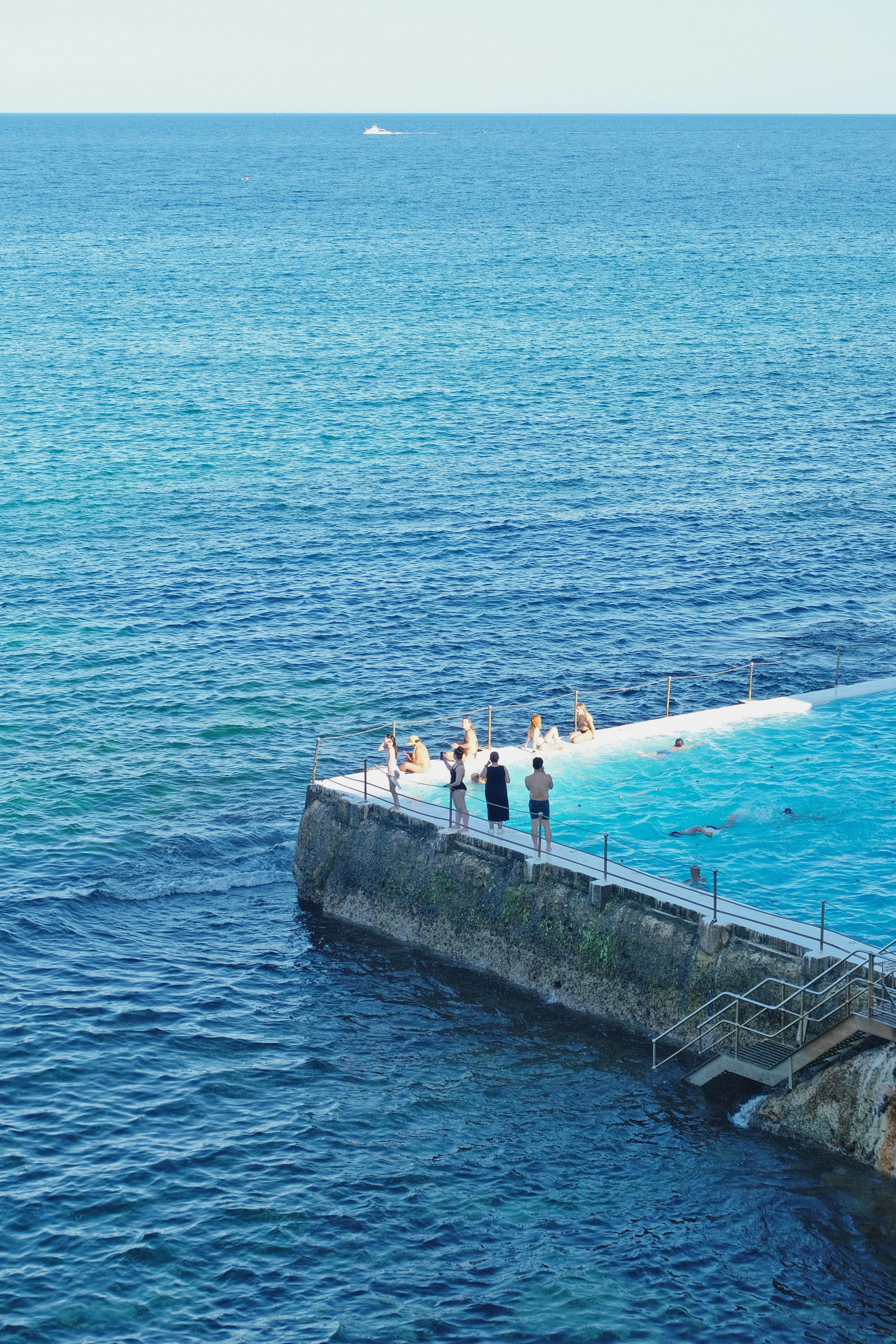 Teal Sea Terrace: A Cliffside Pool Party with Oceanic Blues