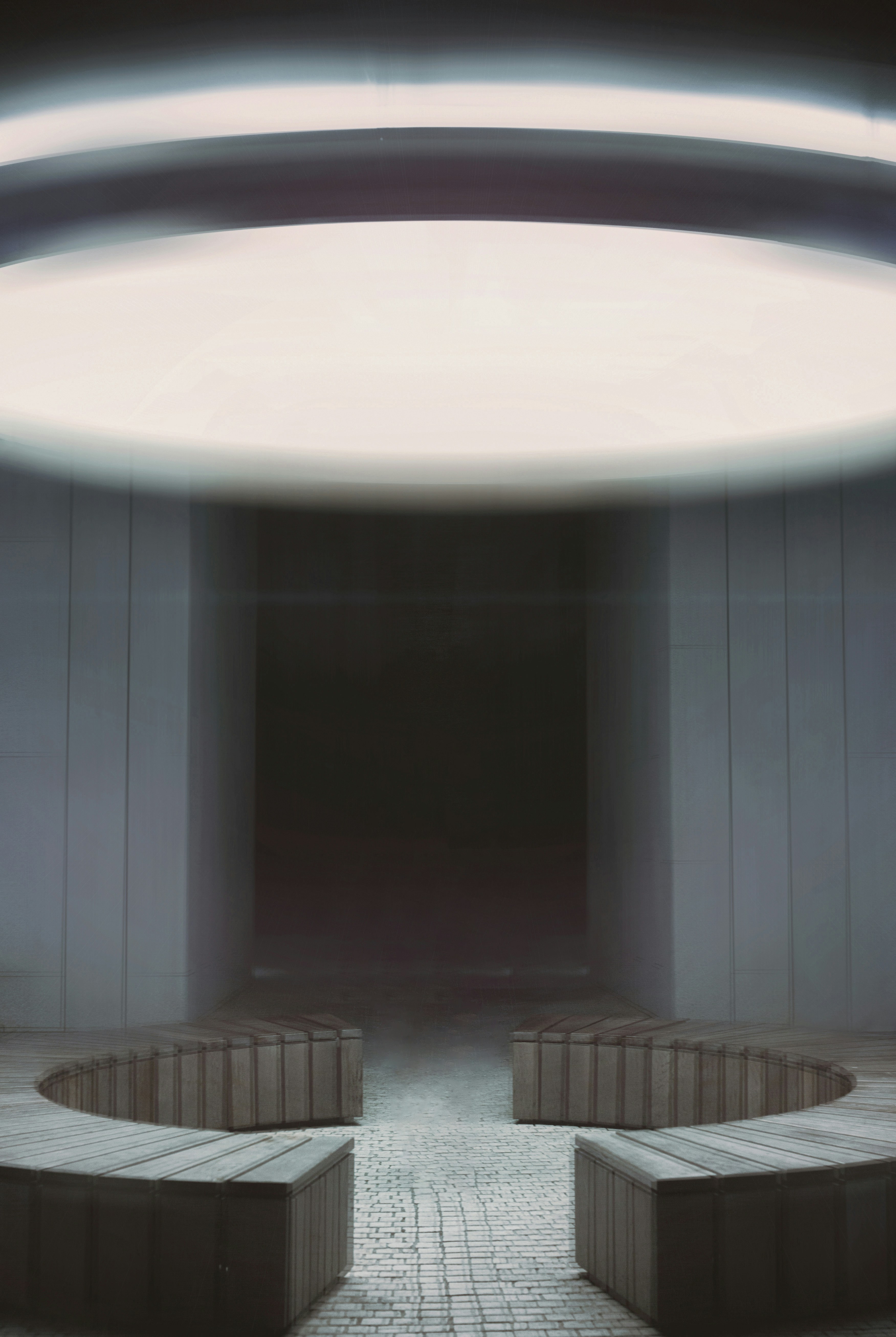 Circular Light Veil Over Quiet Entrance