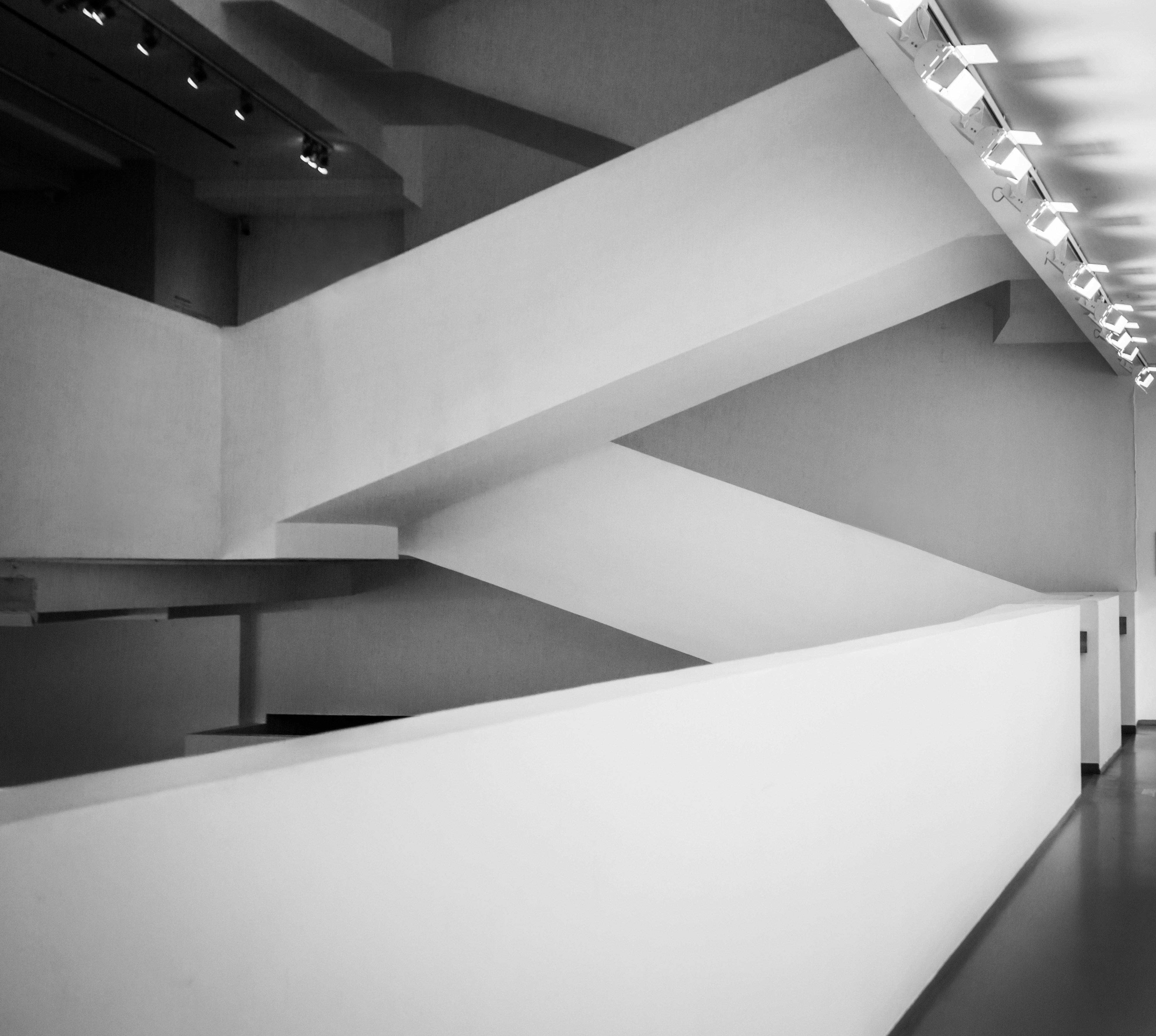 Geometric Overpass: Intersecting Beams in Monochrome Gallery