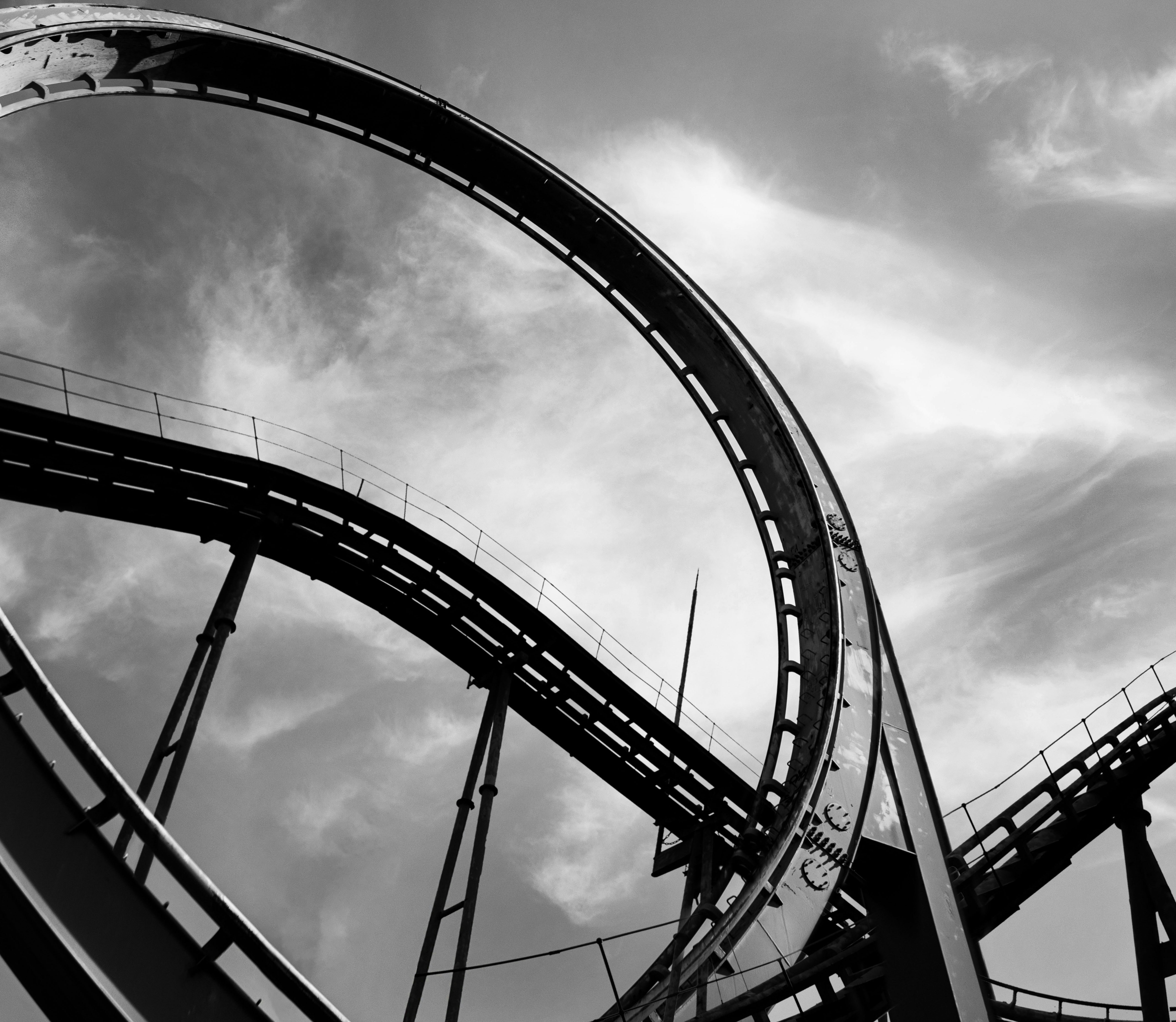 Steel Ribbon: A Looping Monolith Against a Skiescape