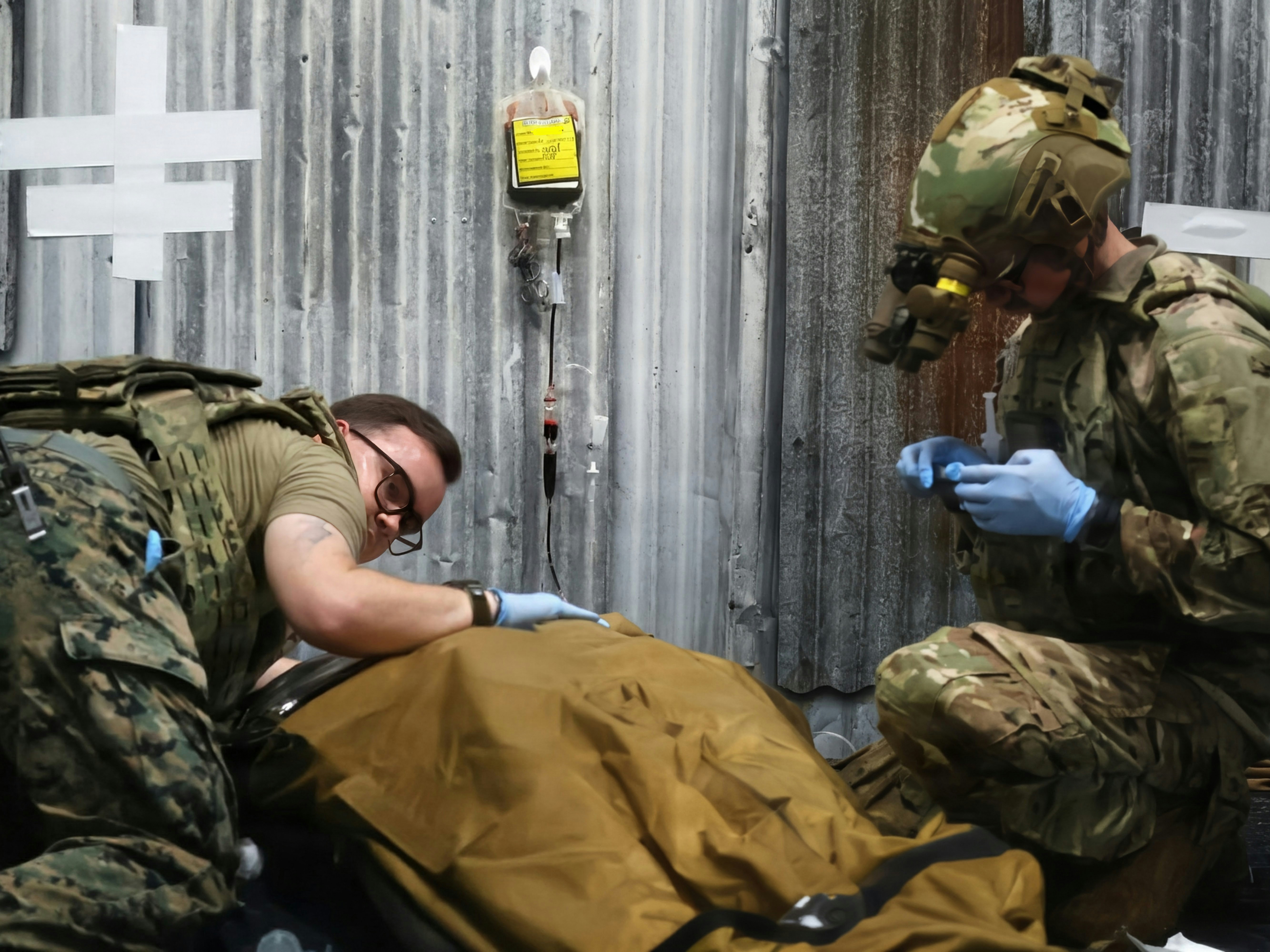 260326-N-UF732-1002 FORT BELVOIR, Va. (March 26, 2026) Hospital Corpsman 2nd Class Tyler Wallace and Hospital Corpsman 2nd Class Joshua Audirsch, assigned to Navy Medicine Readiness and Training Command (NMRTC) Fort Belvoir, assess simulated patient and chart results during NMRTC Fort Belvoir hosted Joint Trauma System (JTS) Valkyrie Course and medical IT integration demonstration on board NMRTC Fort Belvoir, March 26, 2026. The event brought together personnel from Soldier Integration Facility (SIF), JTS Valkyrie, NMRTC Fort Belvoir and key industry partners to test and integrate emergent technologies designed to enhance battlefield situational awareness and improve medical outcomes. NMRTC Fort Belvoir supports the readiness of Sailors, Marines, and joint forces by training and sustaining medically ready personnel and delivering deployable medical capability in support of Fleet and joint operations. (U.S. Navy Photo by Lieutenant Jusen GarciaCordero / Released)