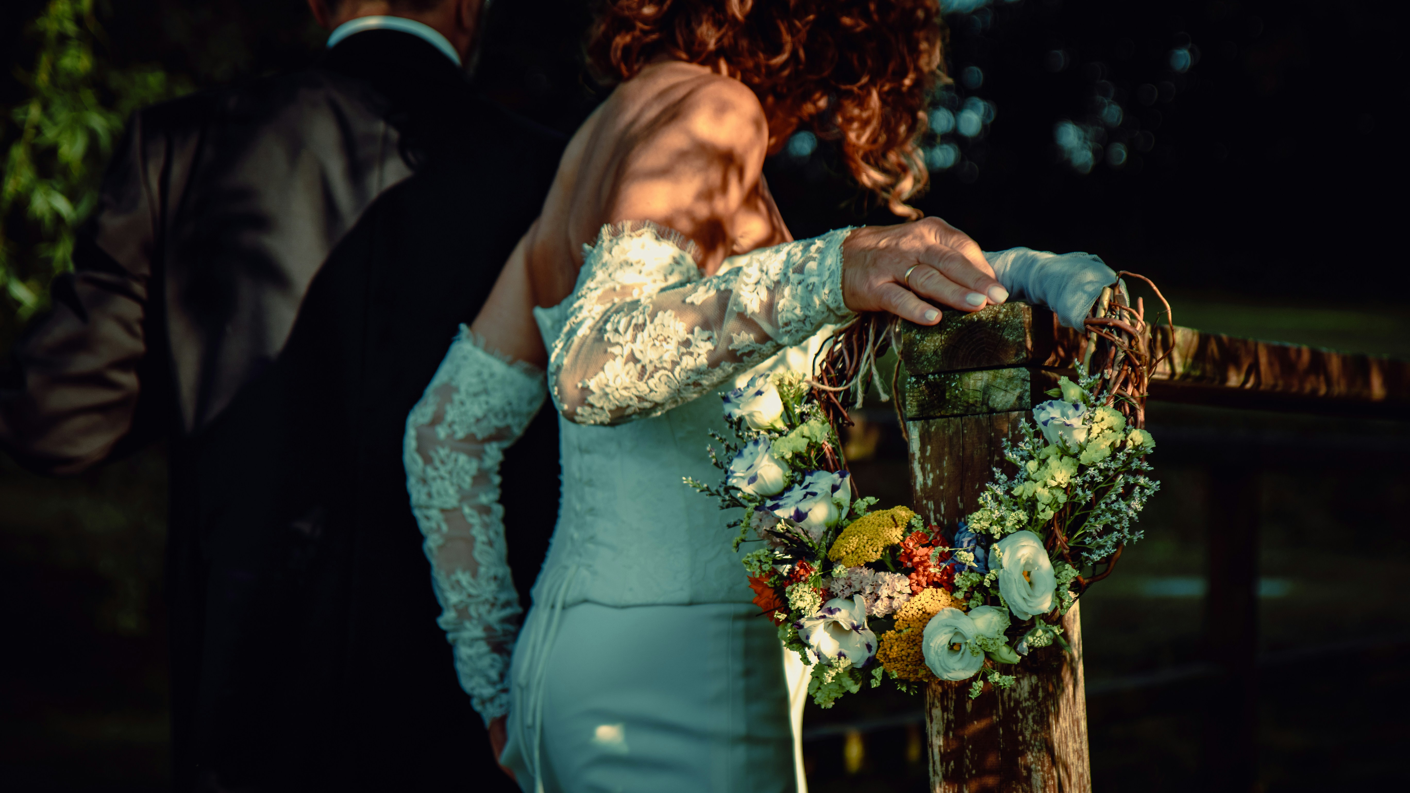 Wrapped in White: A Quiet Moment at the Edge of the Reception