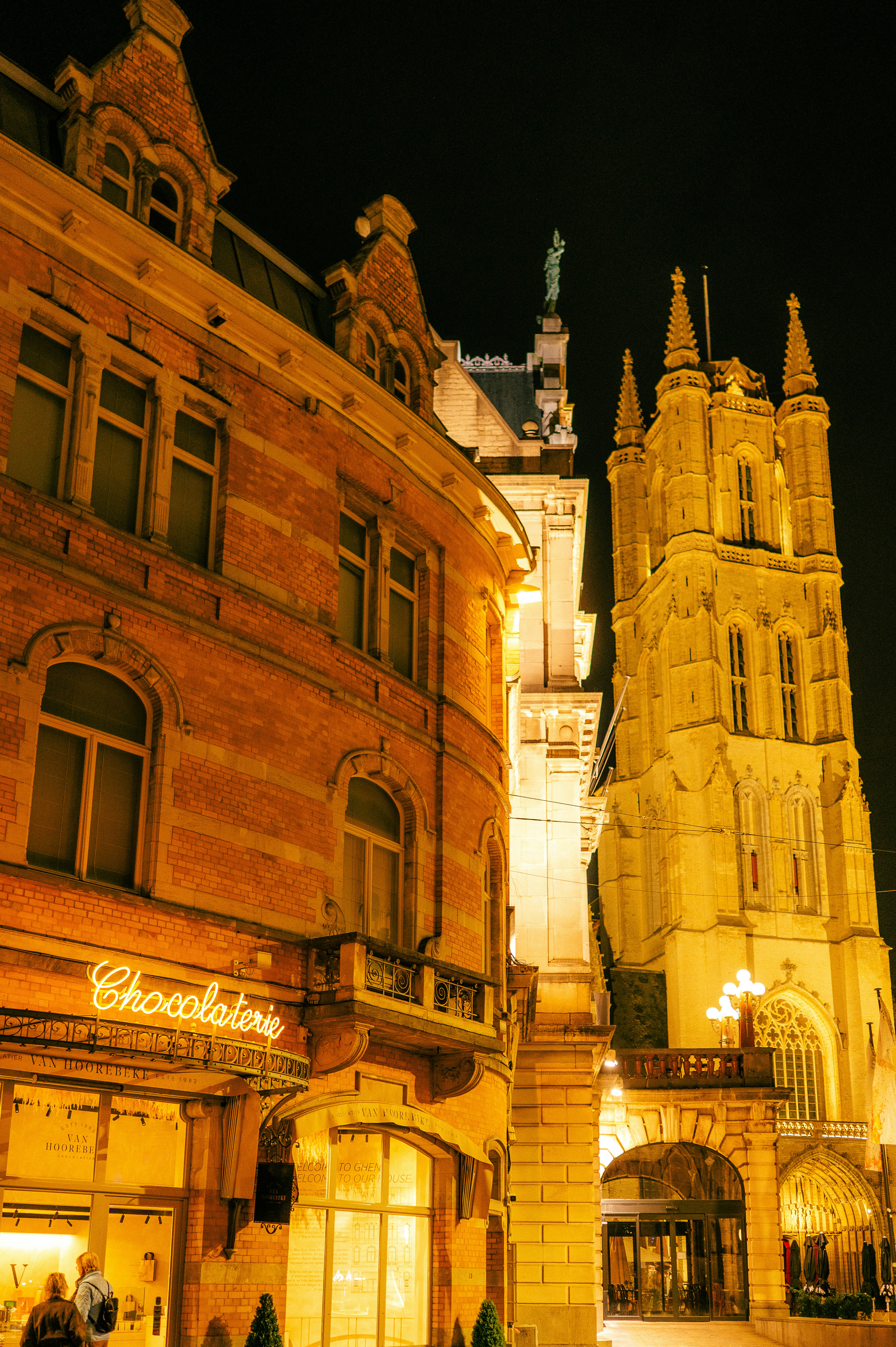 Golden Cathedral and Chocolate Courtyard: Night Portrait of a Historic Street