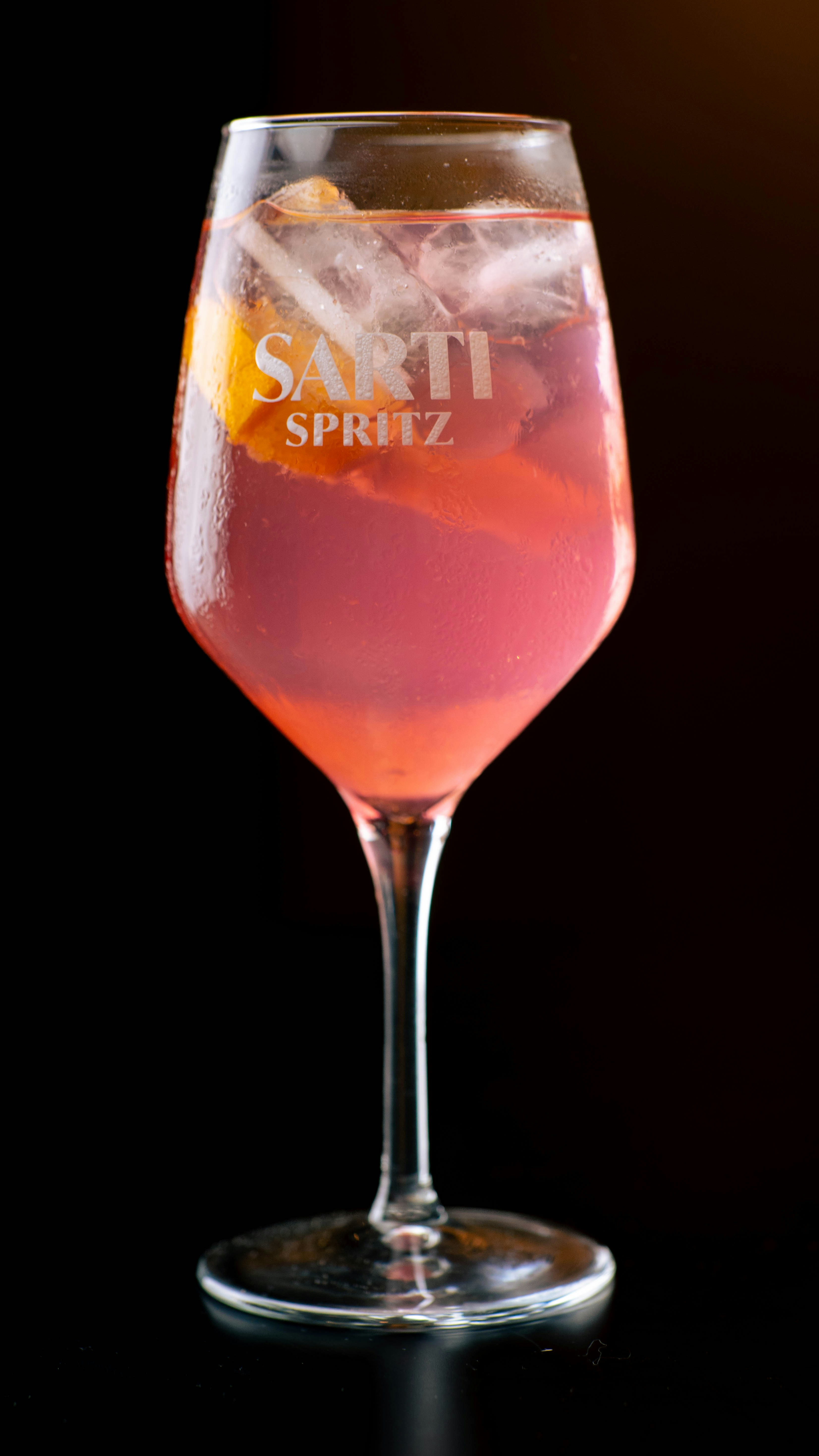 Sculpted Sunset: Pink Spritz in a Stemmed Glass