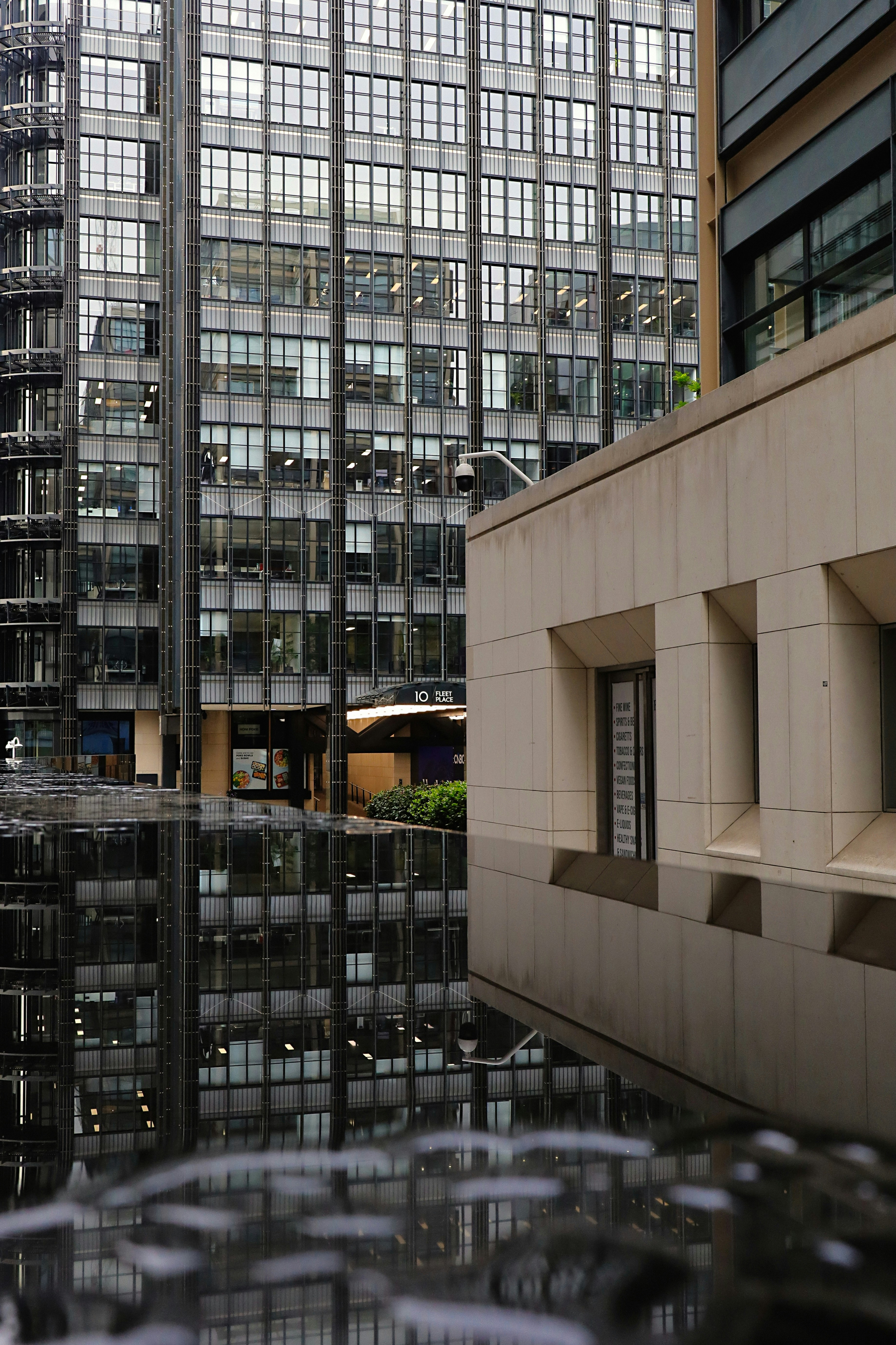 Glass Facades & Reflections: Urban Geometry by the Courtyard Edge