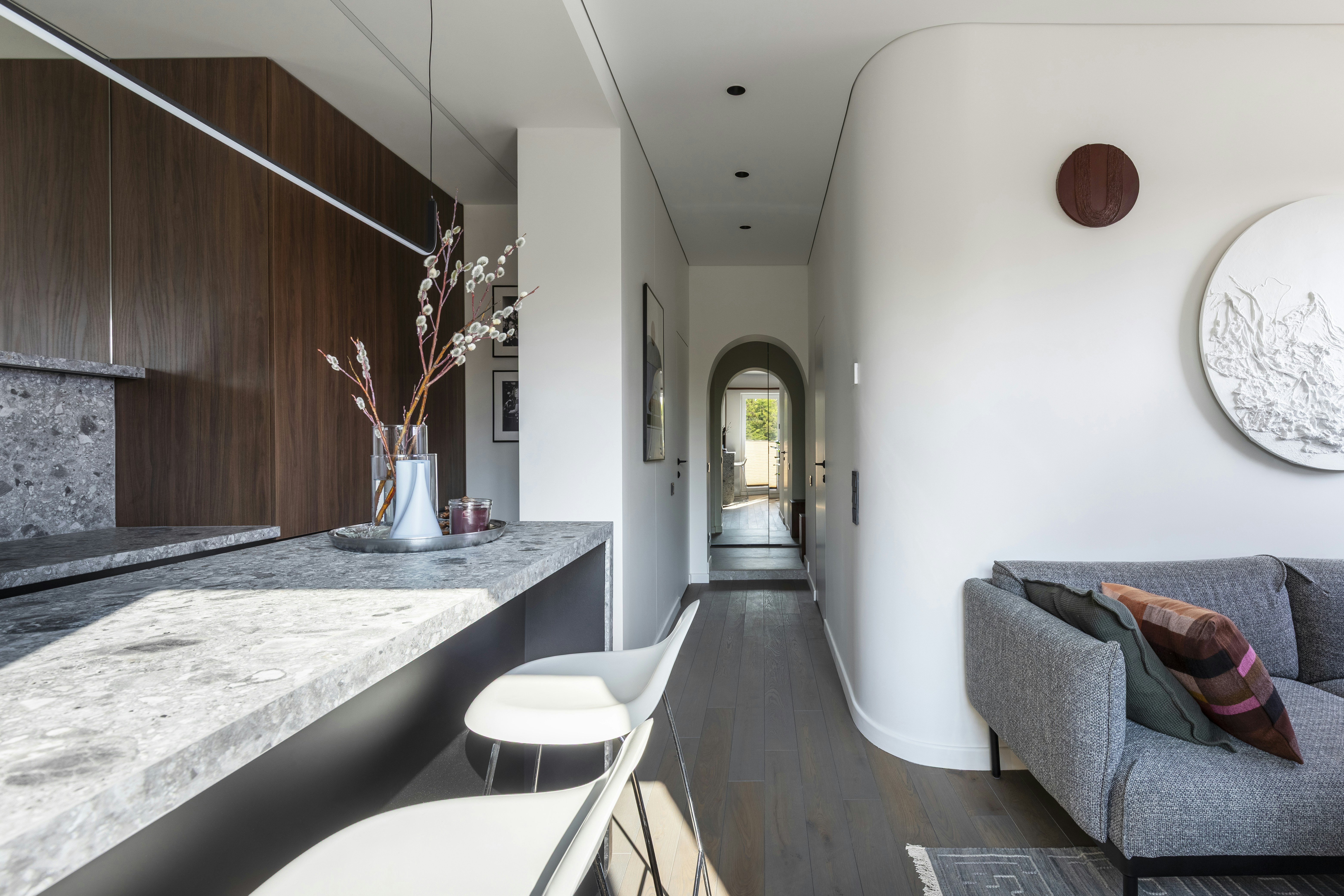 Sunlit Corridor View: A Seamless Transition from Kitchen to Living Room