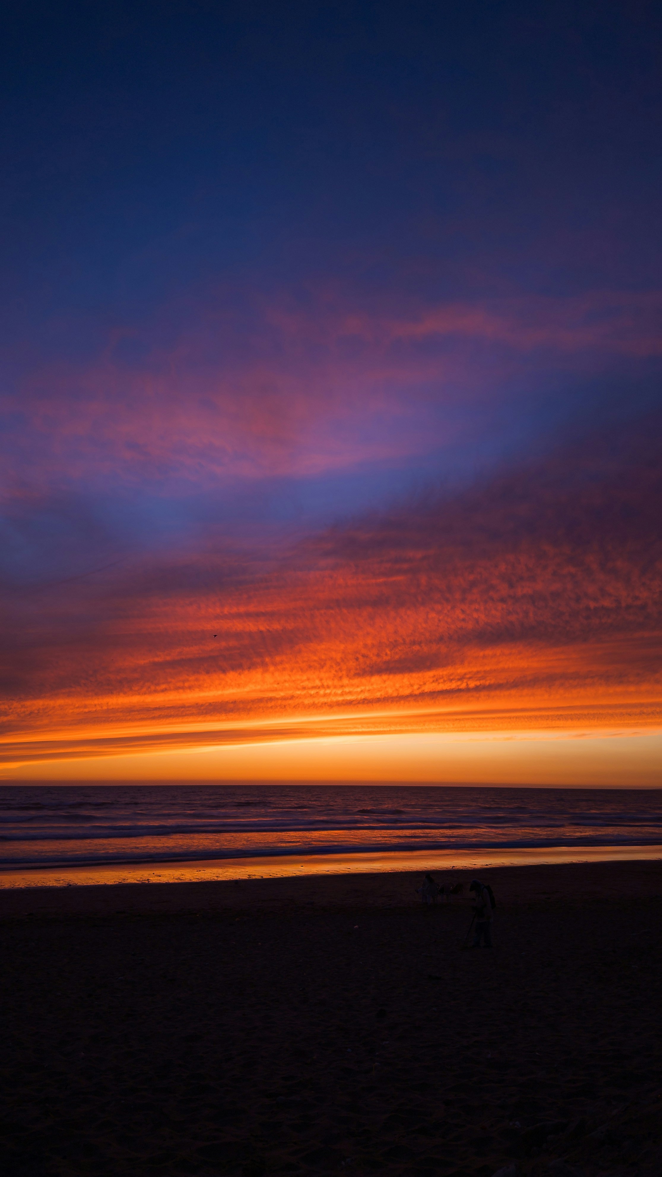 Embered Horizon Over Quiet Tides