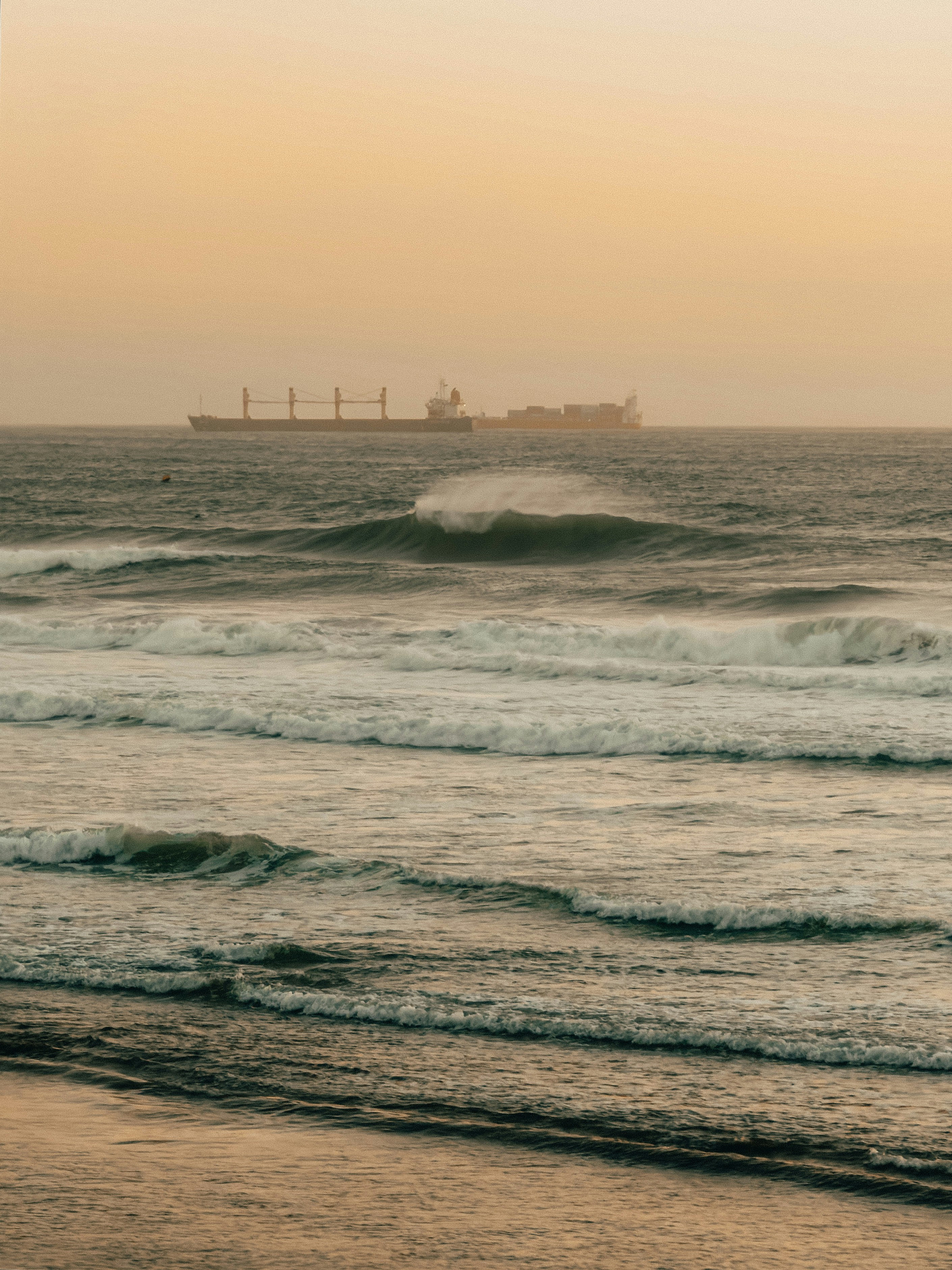 Horizon Transport: Distant freighters Beyond the Sunset Waves