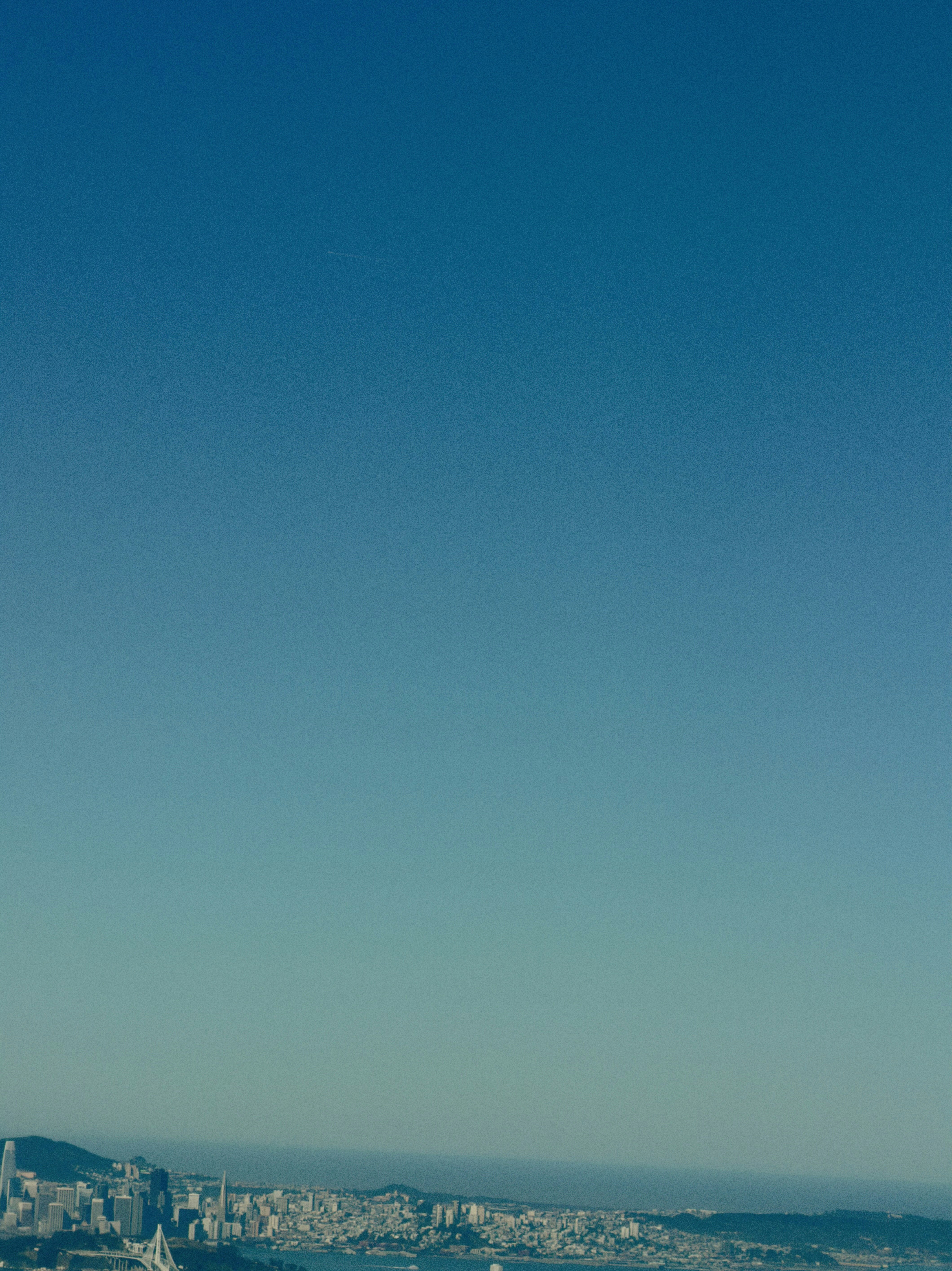 Coastal Skyline Under a Clear Gradient Sky