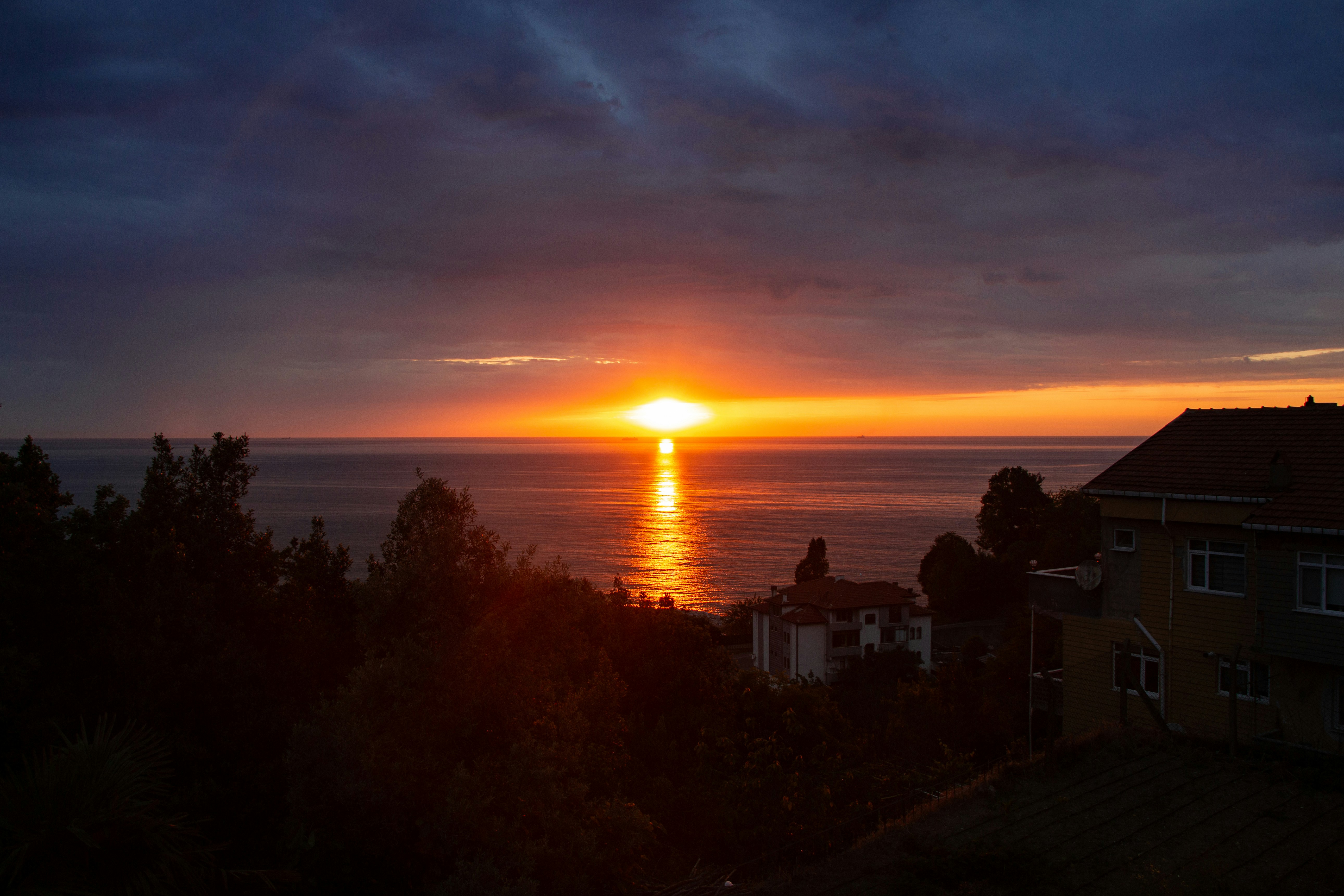 Sunlit shoreline at dusk: a tranquil coastal overlook