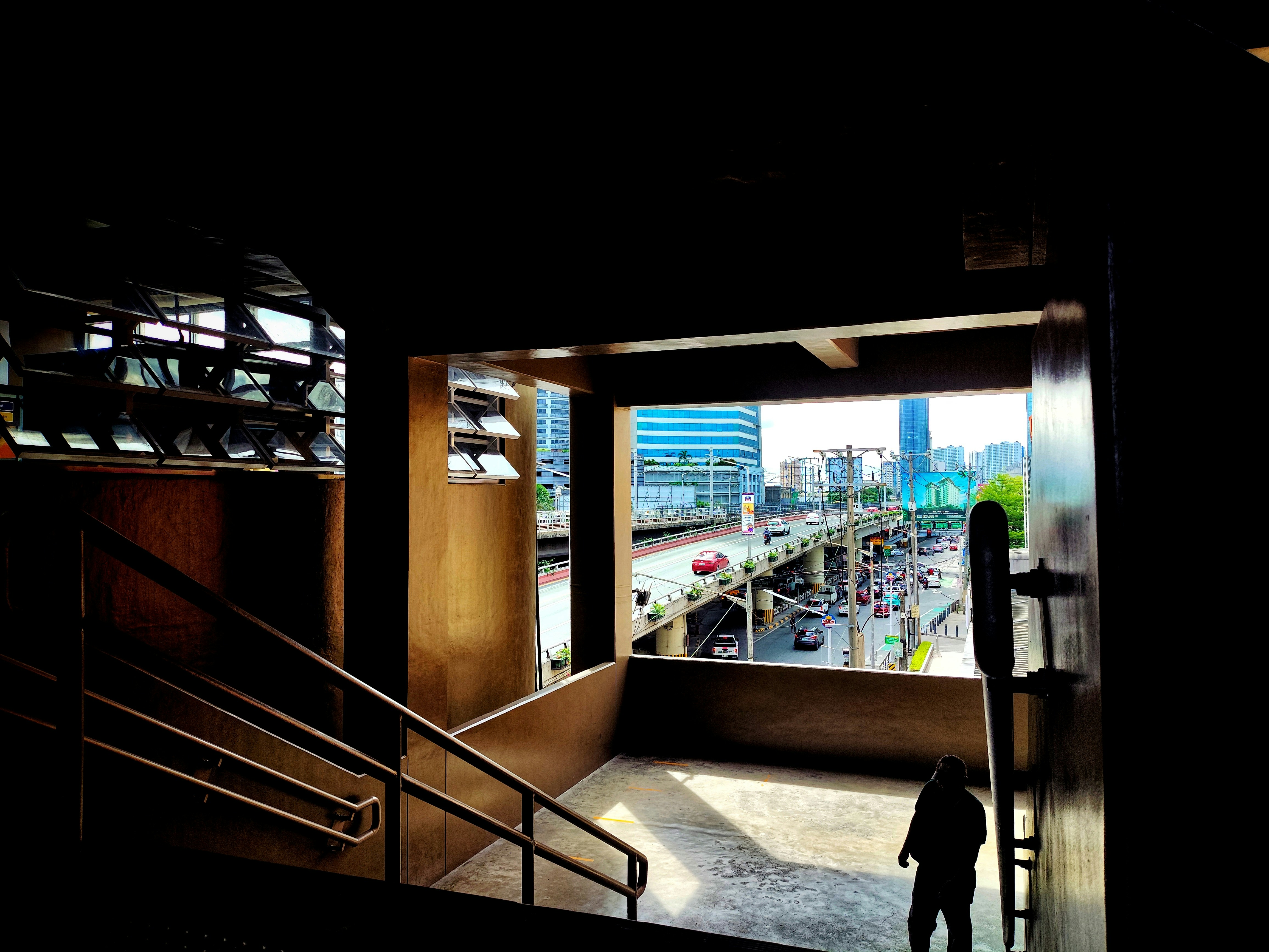 City View Through a Dark Corridor: A Step into the Light