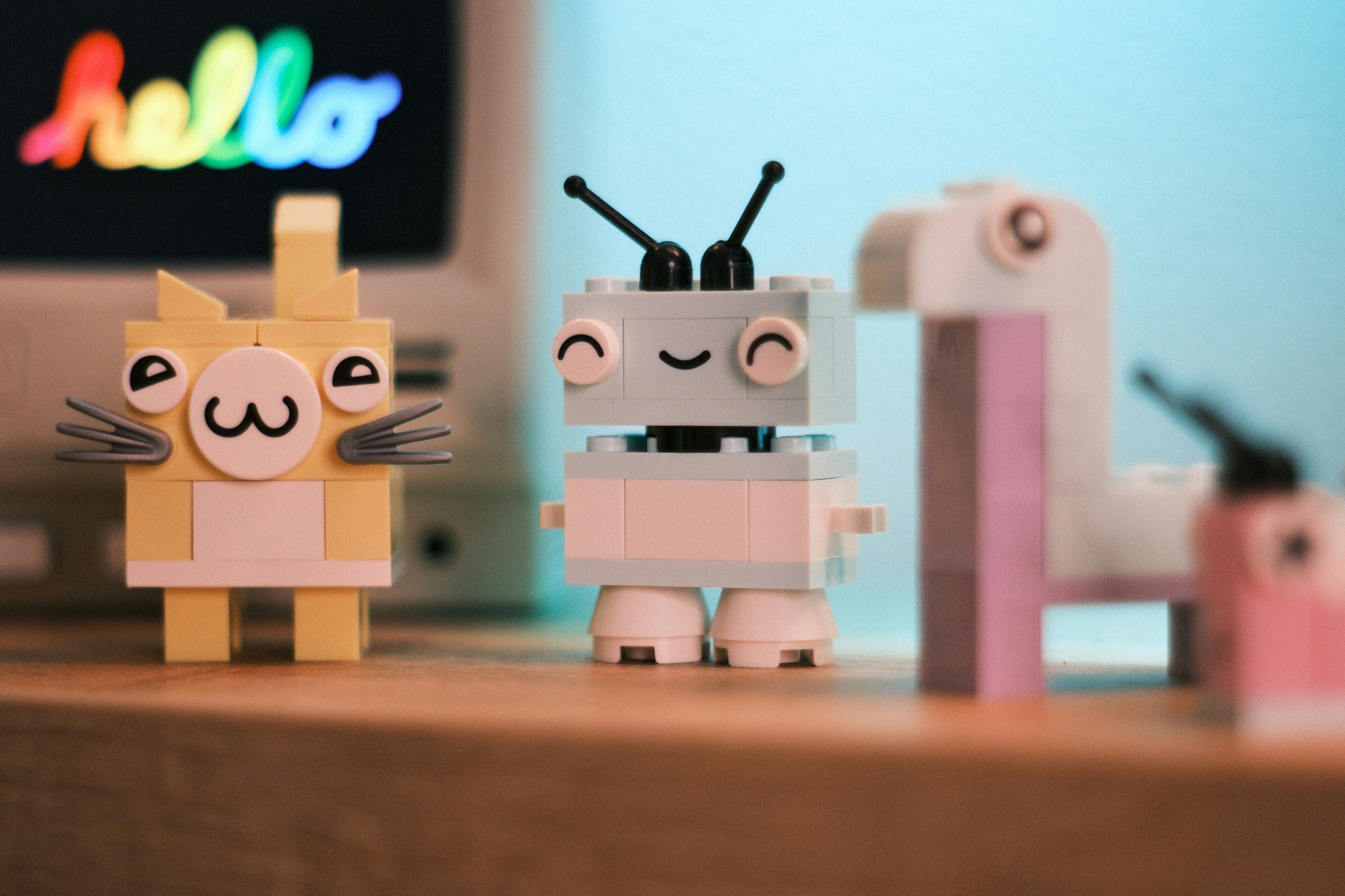Playful LEGO Friends: Whimsical Bots on a Colorful Desk